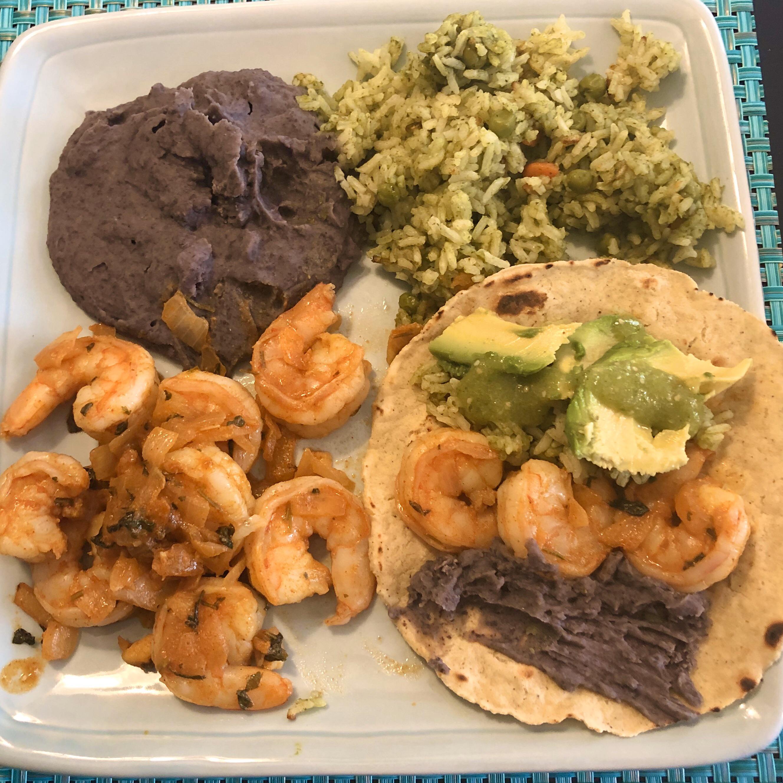 Shrimp tacos with black beans and arroz verde | Scrolller