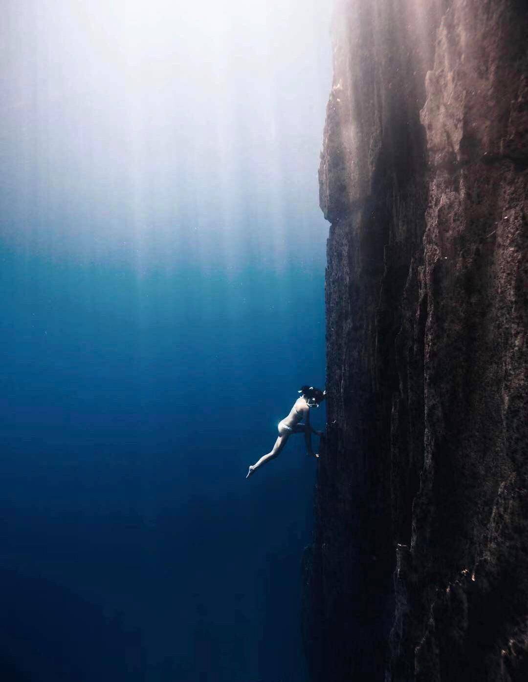 steep underwater cliff. | Scrolller