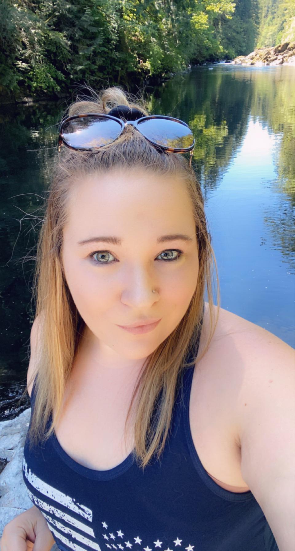 Stopped to enjoy the peaceful river | Scrolller