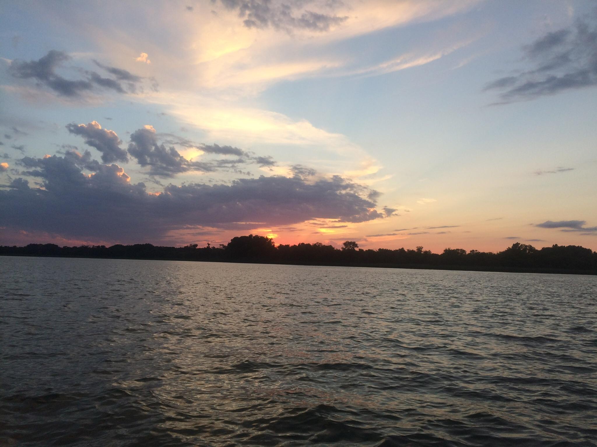 Sunset over lake. | Scrolller