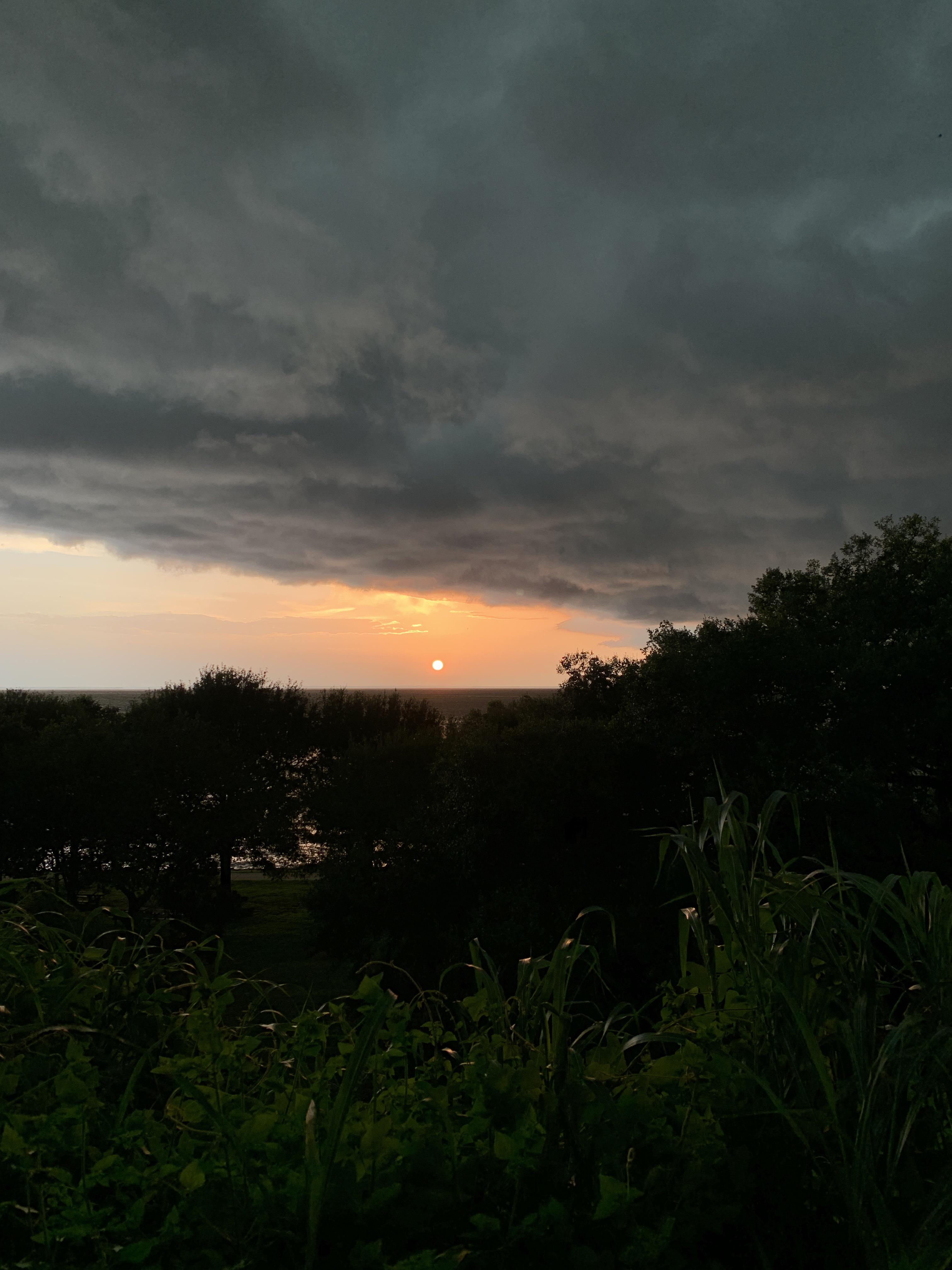 Sunset summer storm on the bluff, Fairhope, AL. | Scrolller