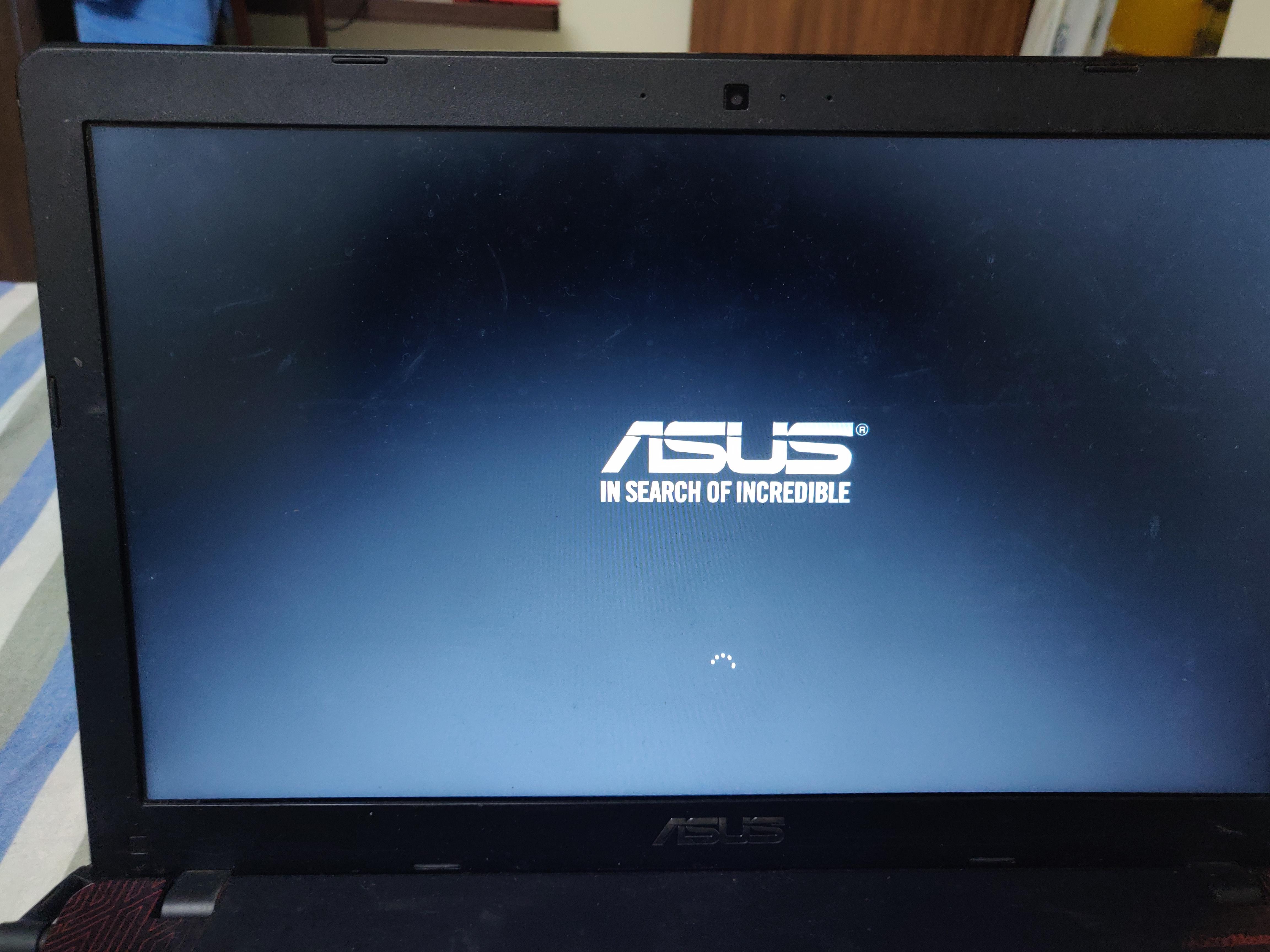 [SUPPORT] my asus laptop is stuck on the asus boot screen. The little ...
