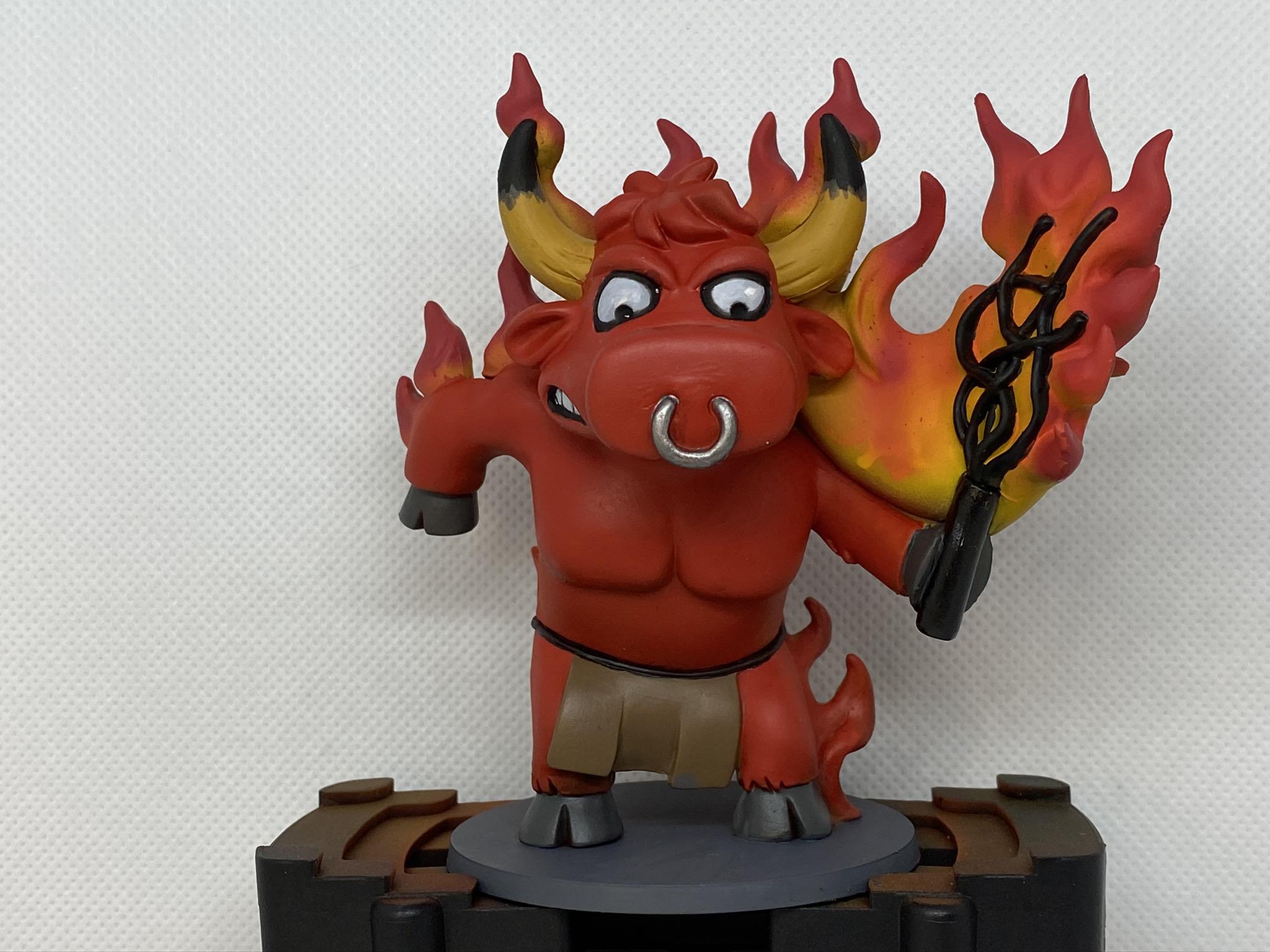 The Bullrog from Munchkin Dungeon. Youtube tutorial on how to paint this mini in the comments ...