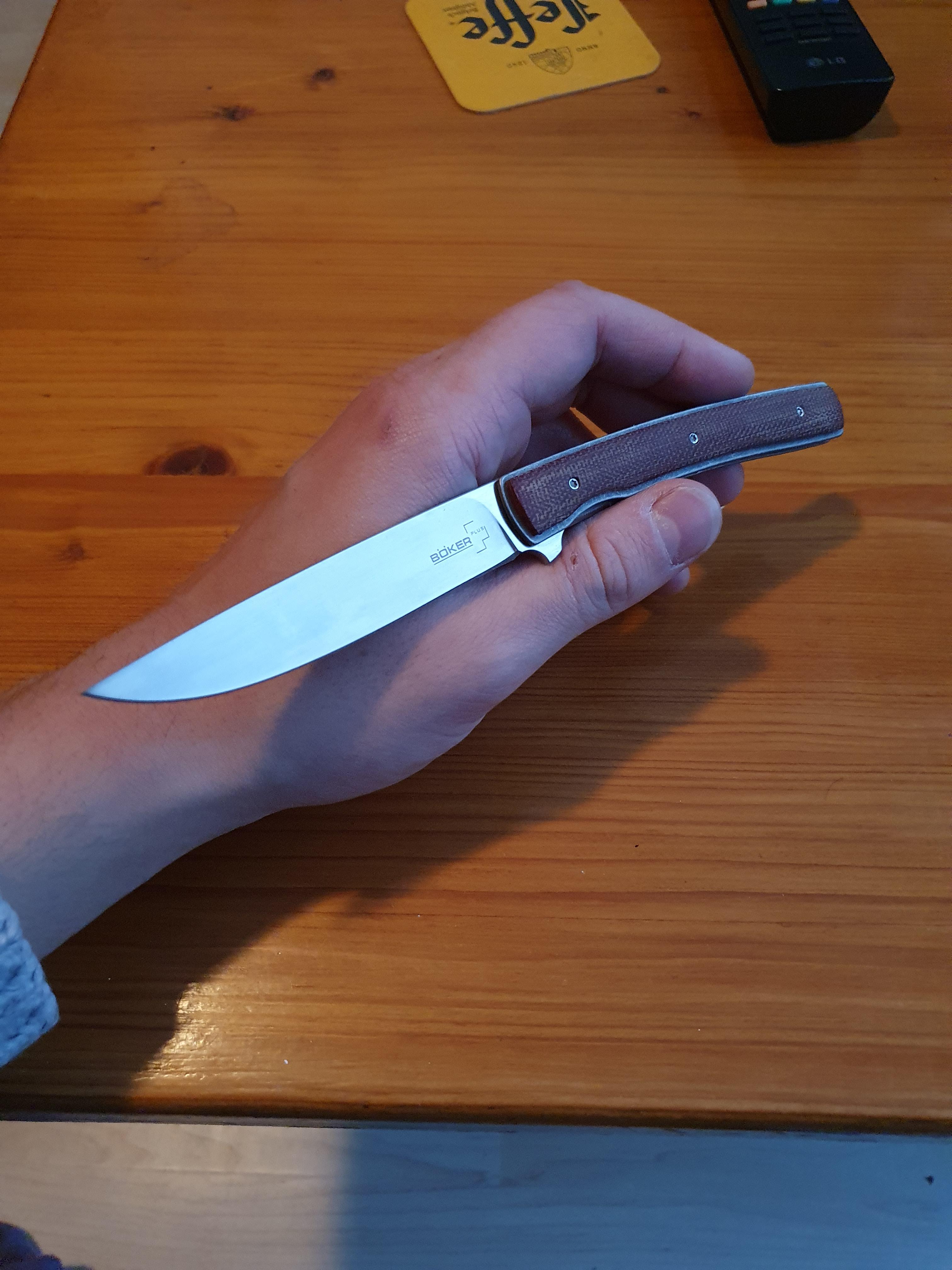 The urban trapper in brown micarta. | Scrolller