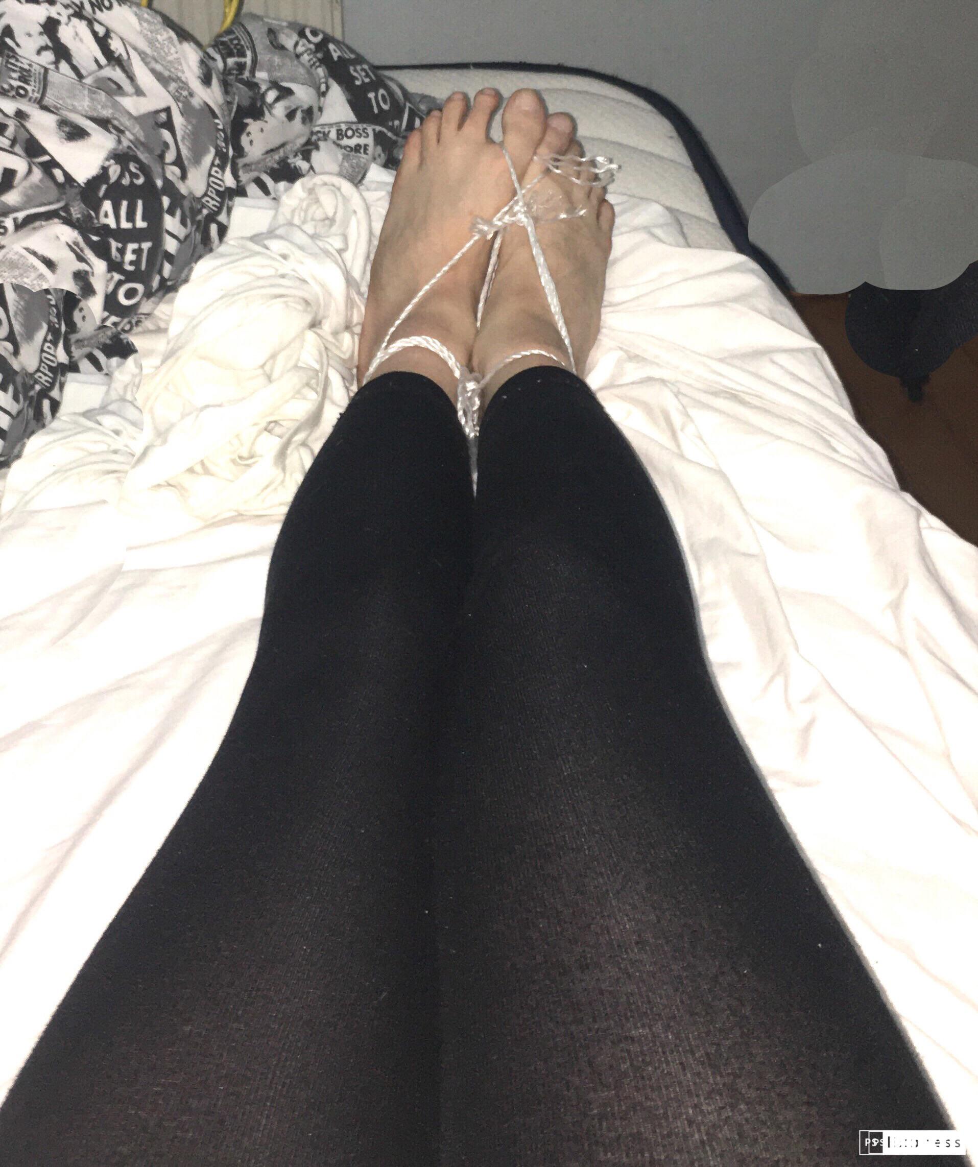 Tightly Bound Toes And Ankles With Black Thermal Leggings Any Leg