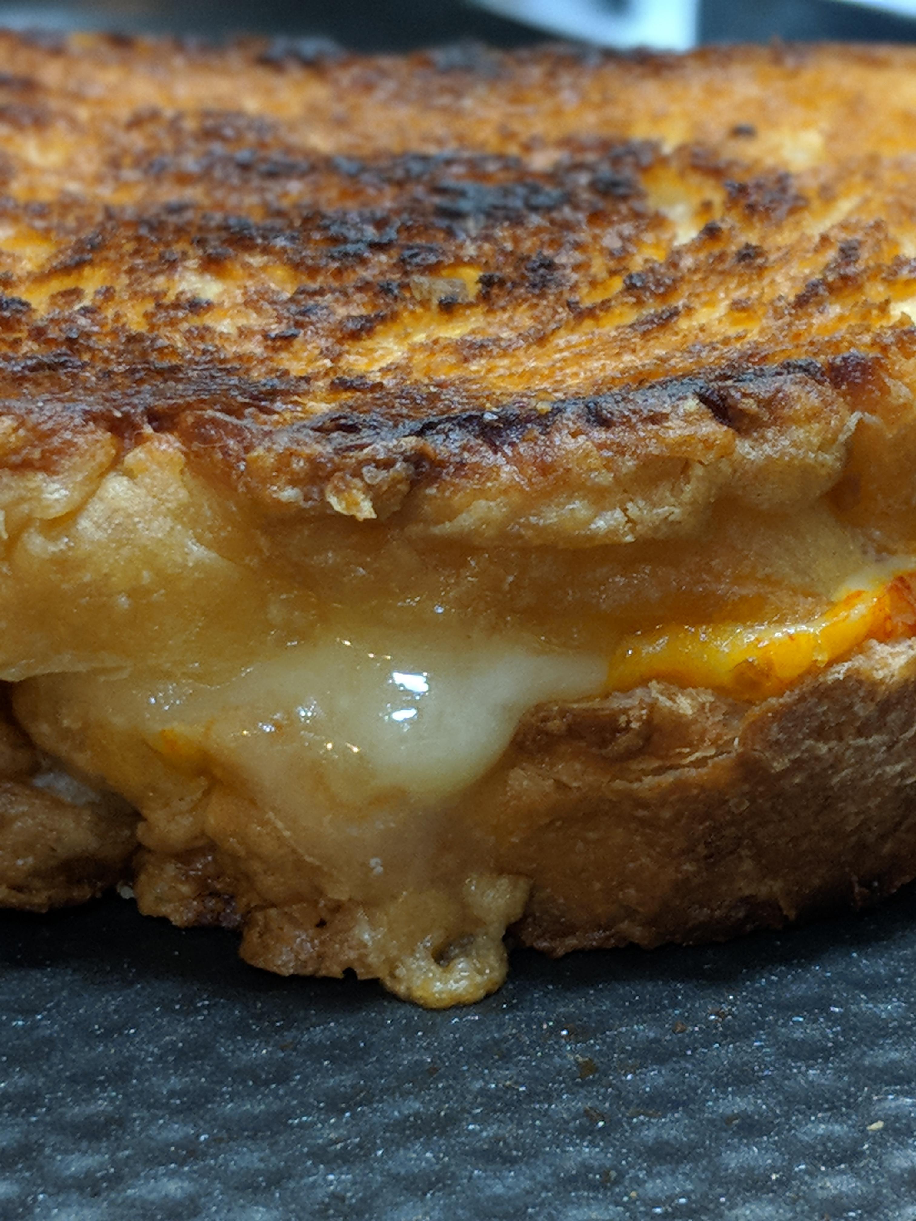 Triple threat: 3 cheeses on a 3 cheese bread | Scrolller