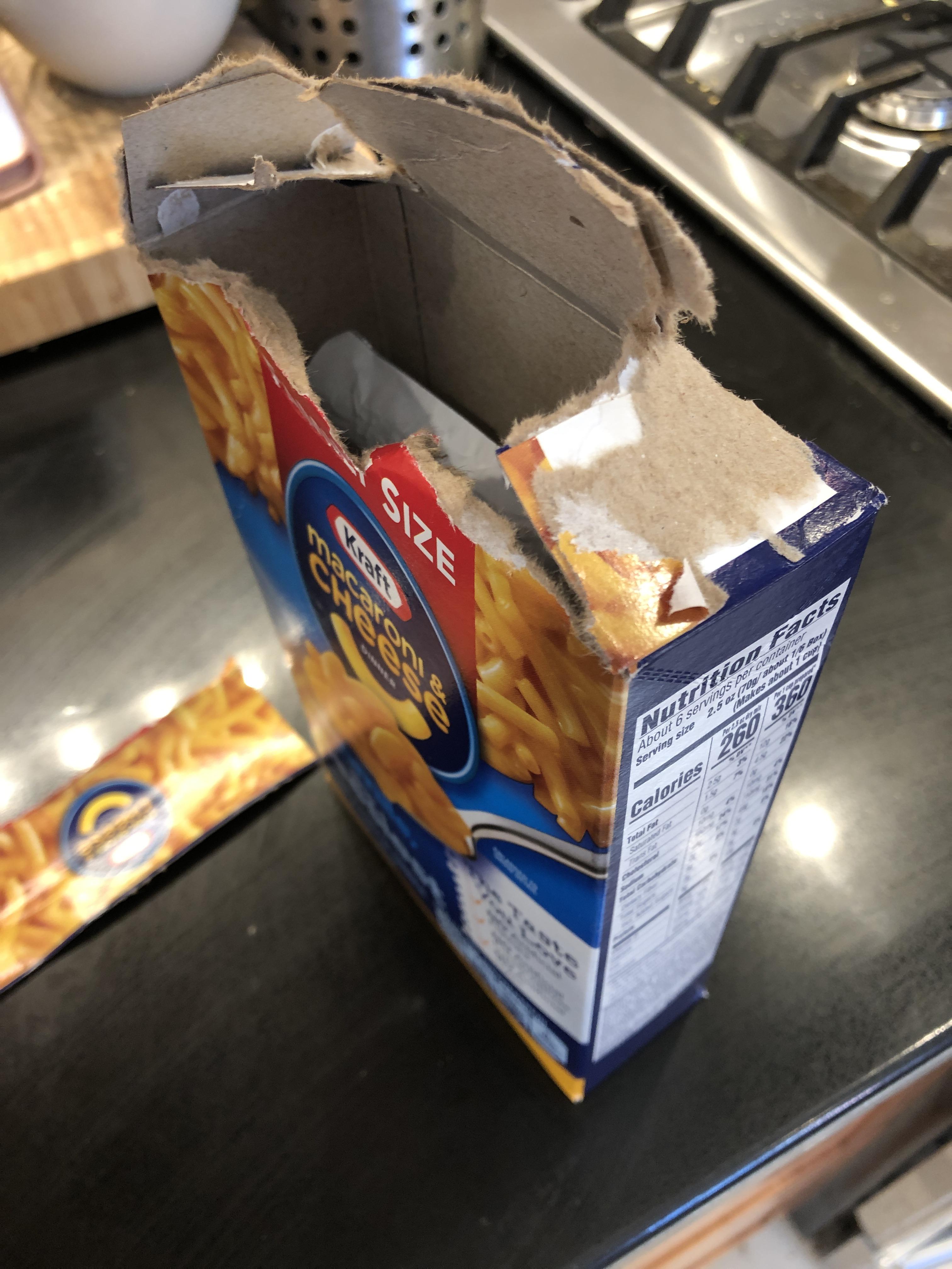 Trying to open the Mac n cheese box | Scrolller