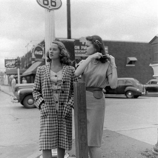 Twins waiting at a bus stop on Route 66, Tulsa, Oklahoma, 1947 | Scrolller