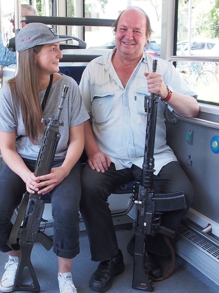 Two generations of Swiss shooters and Swiss army rifles | Scrolller