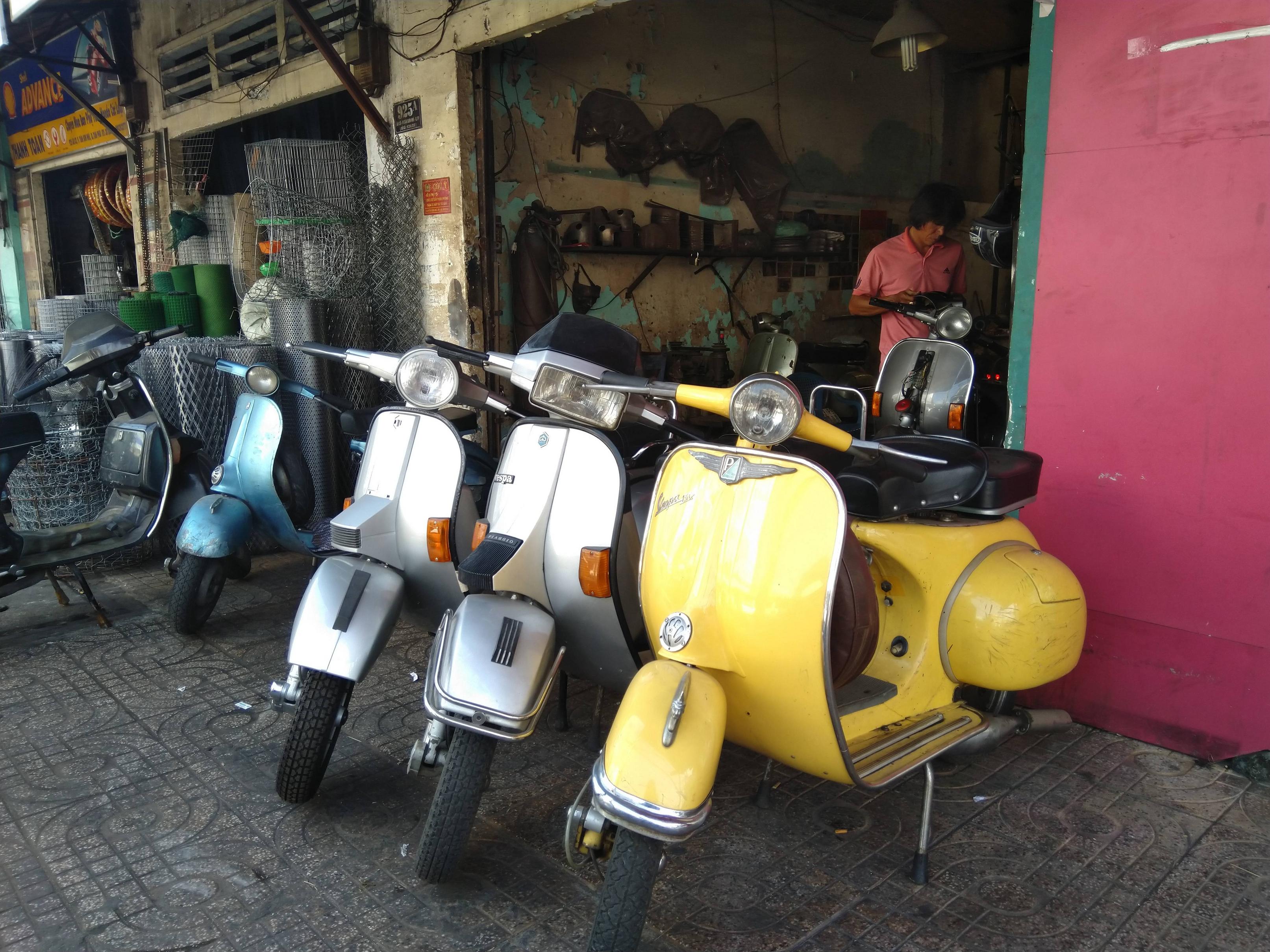 Vintage Vespa shop, Saigon | Scrolller