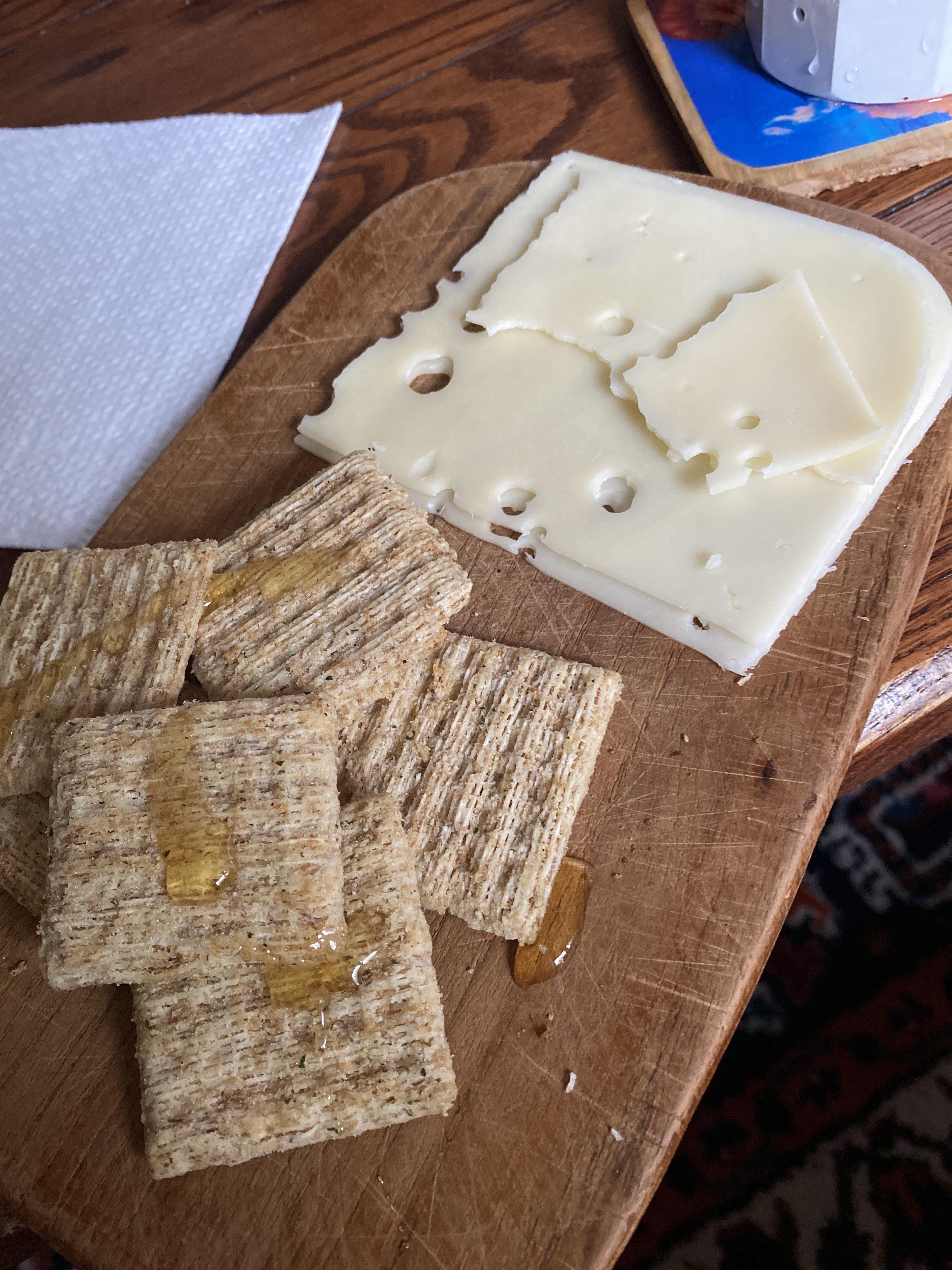 Weird flex triscuits drizzled with honey and Swiss cheese | Scrolller