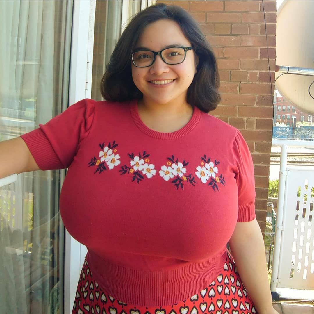 White flowers across mountain peaks. | Scrolller