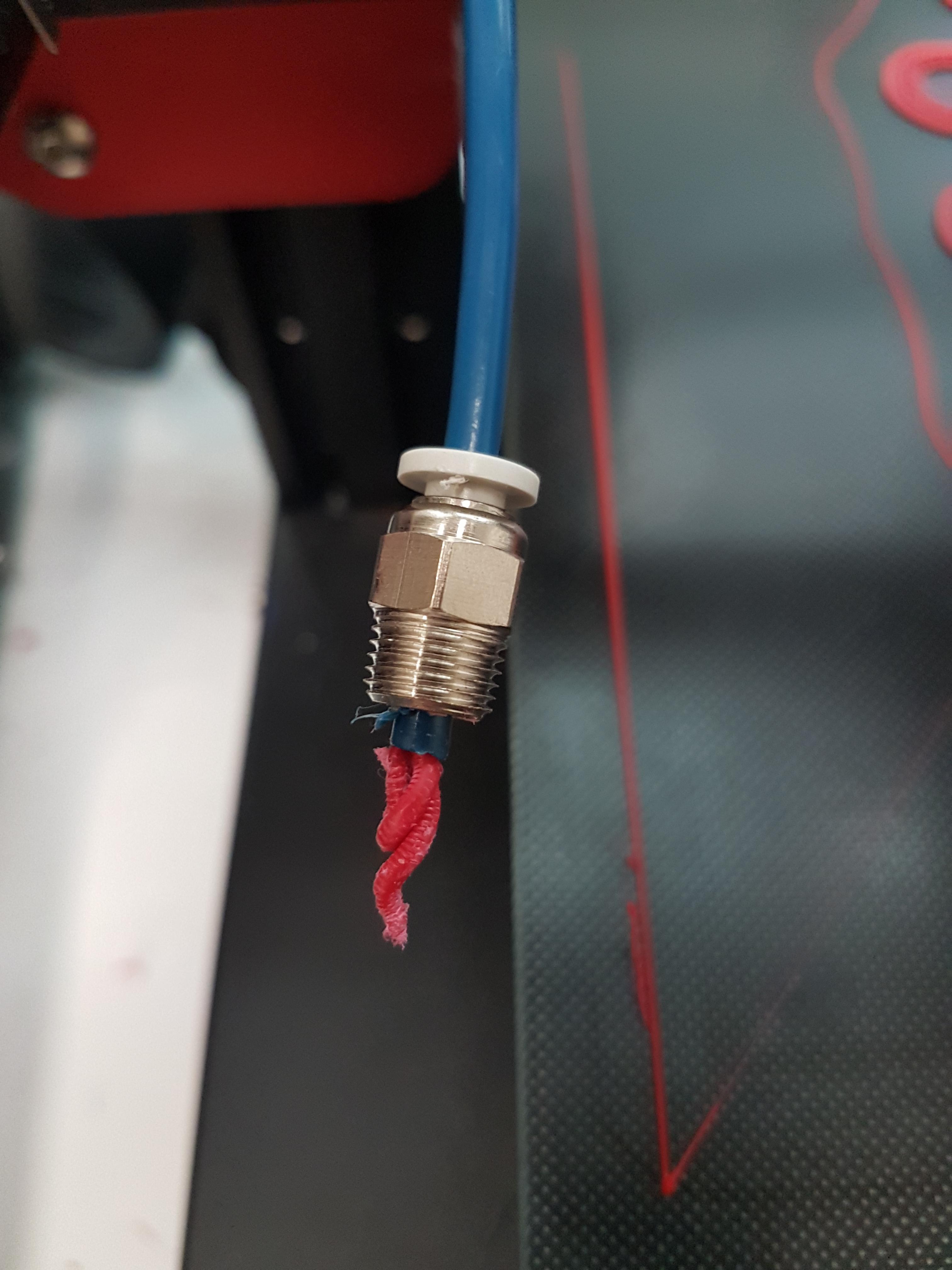 Why is this happening at the extruder end of my CR-10S Pro? the filament breaks after a few ...