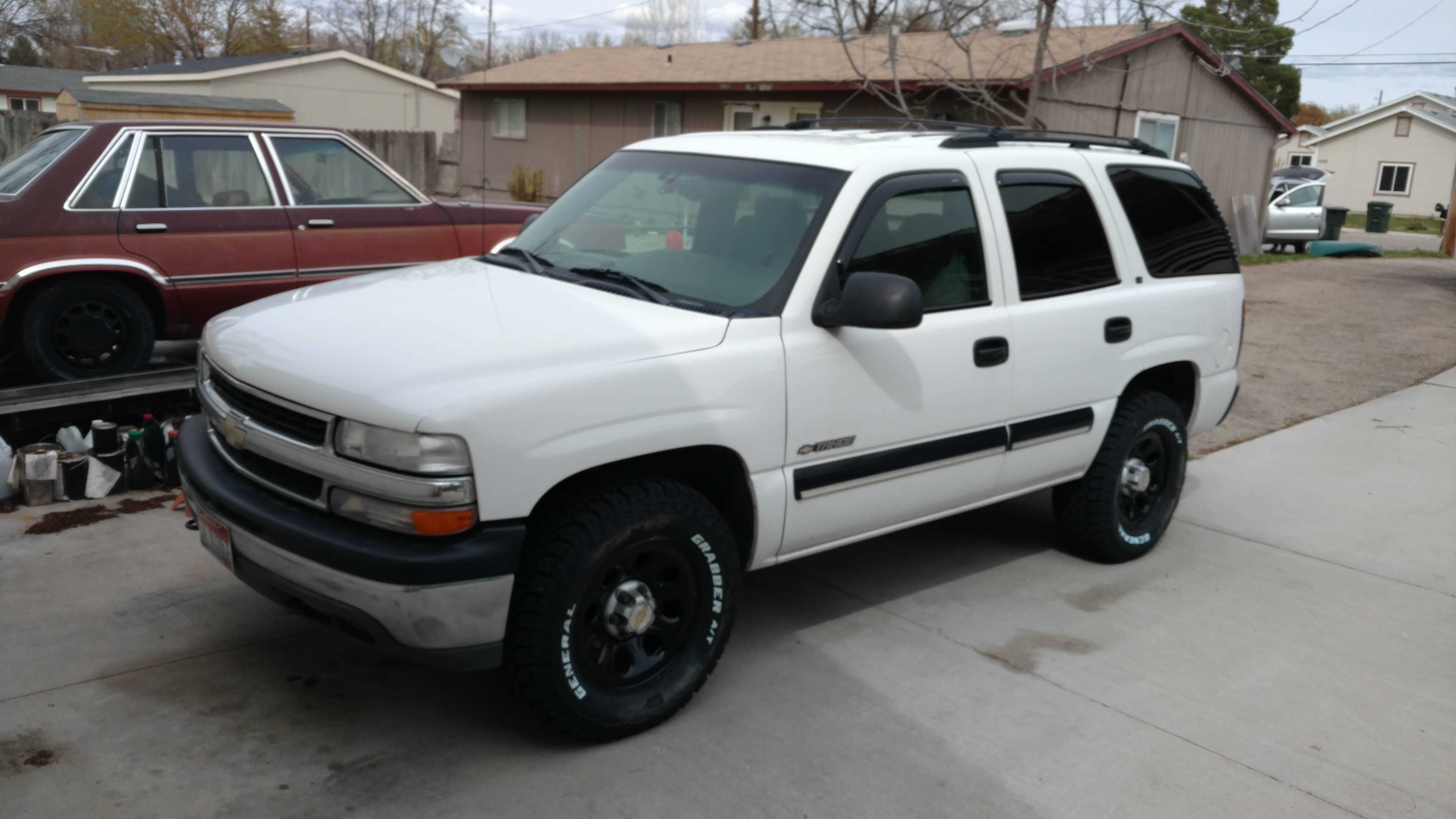 01 Tahoe w/ new 285 Grabber ATx and black wheels. | Scrolller