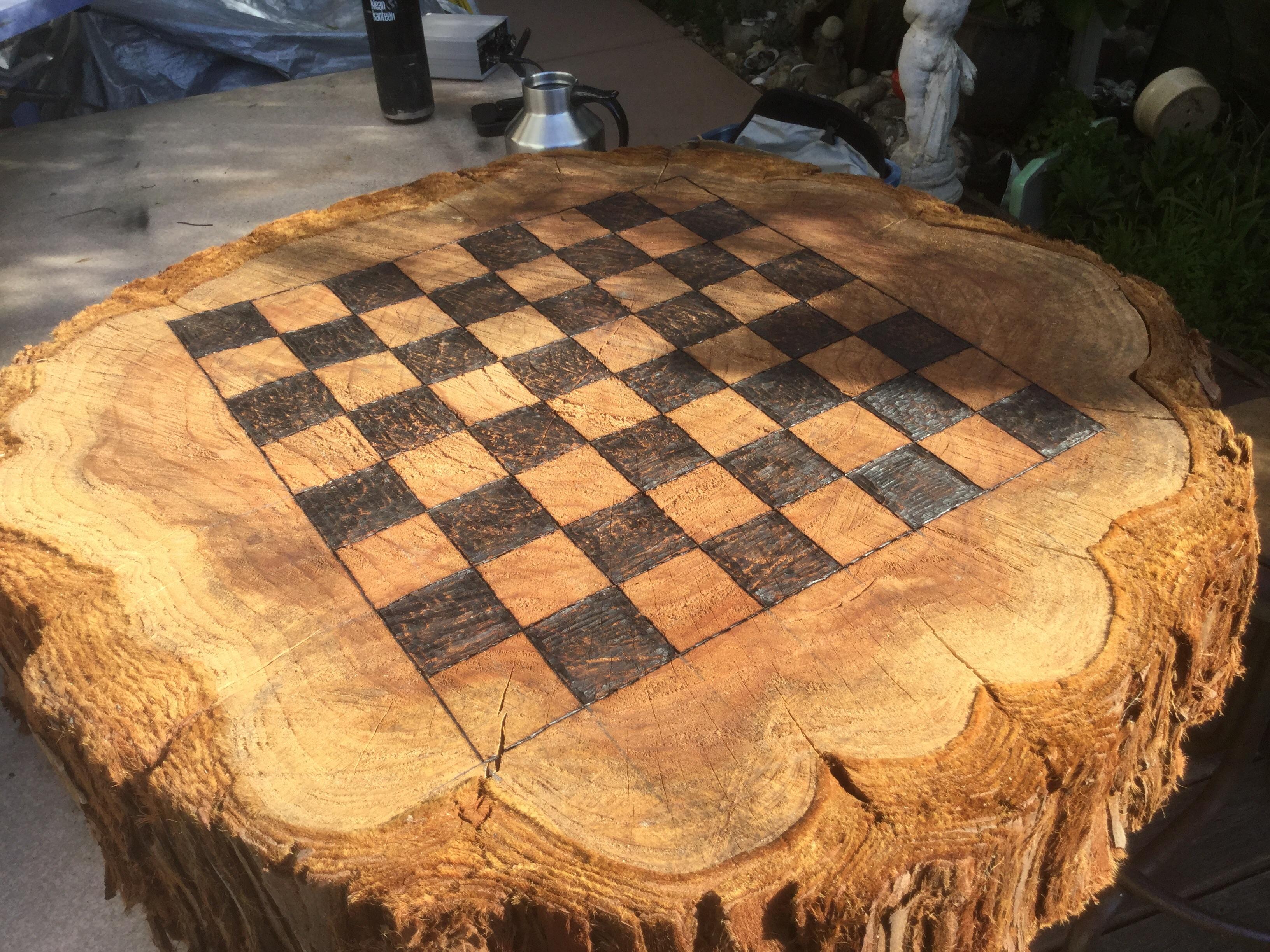A chess/checkers board I burned on a redwood round | Scrolller