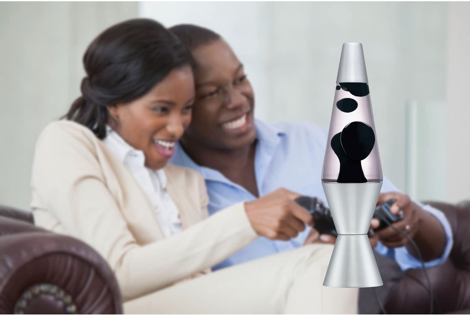 A couple intensely gaming whilst looking at a lava lamp | Scrolller