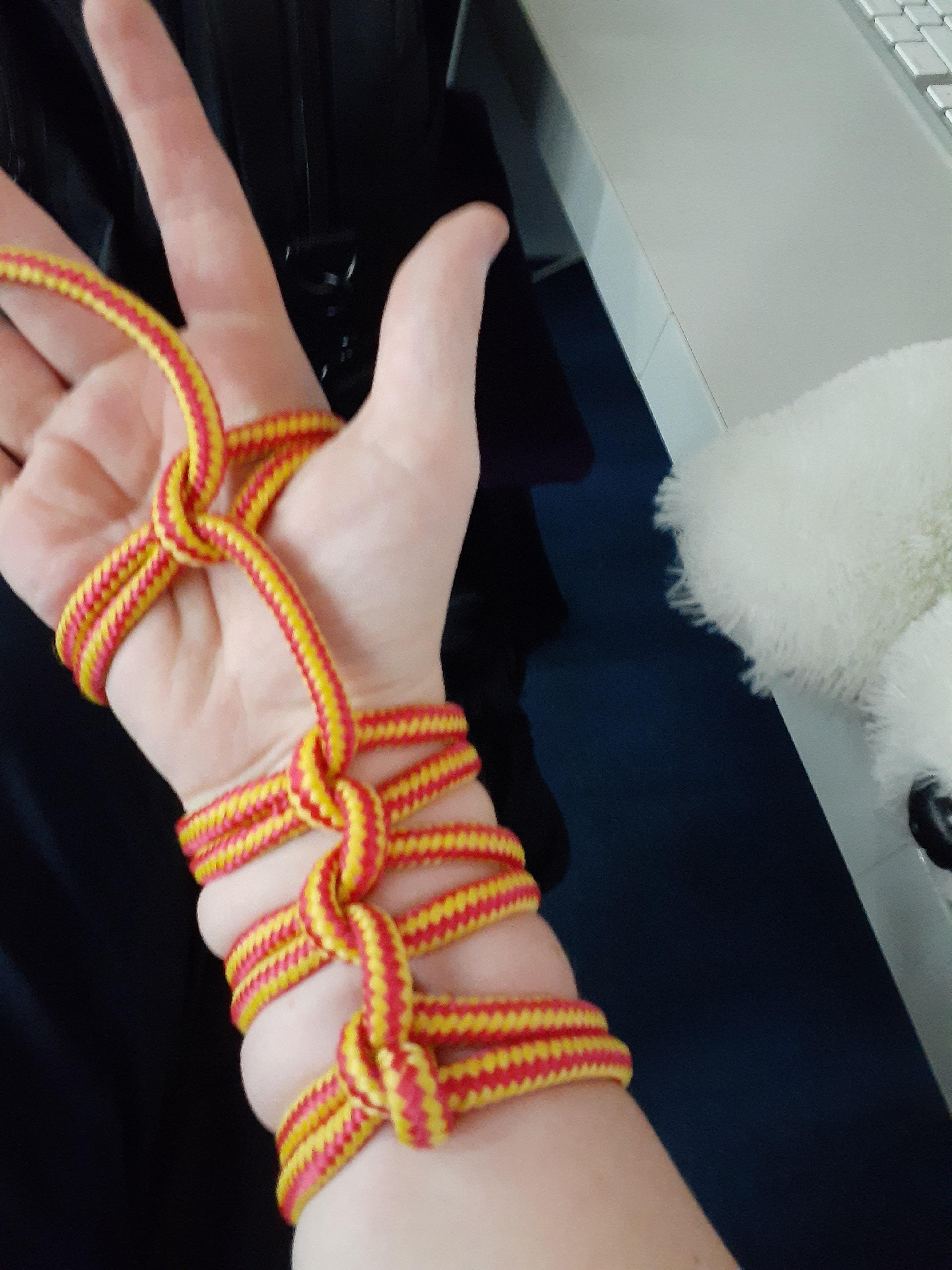 A friend of mine who is new to bondage was practicing some knots and he was really proud of this ...