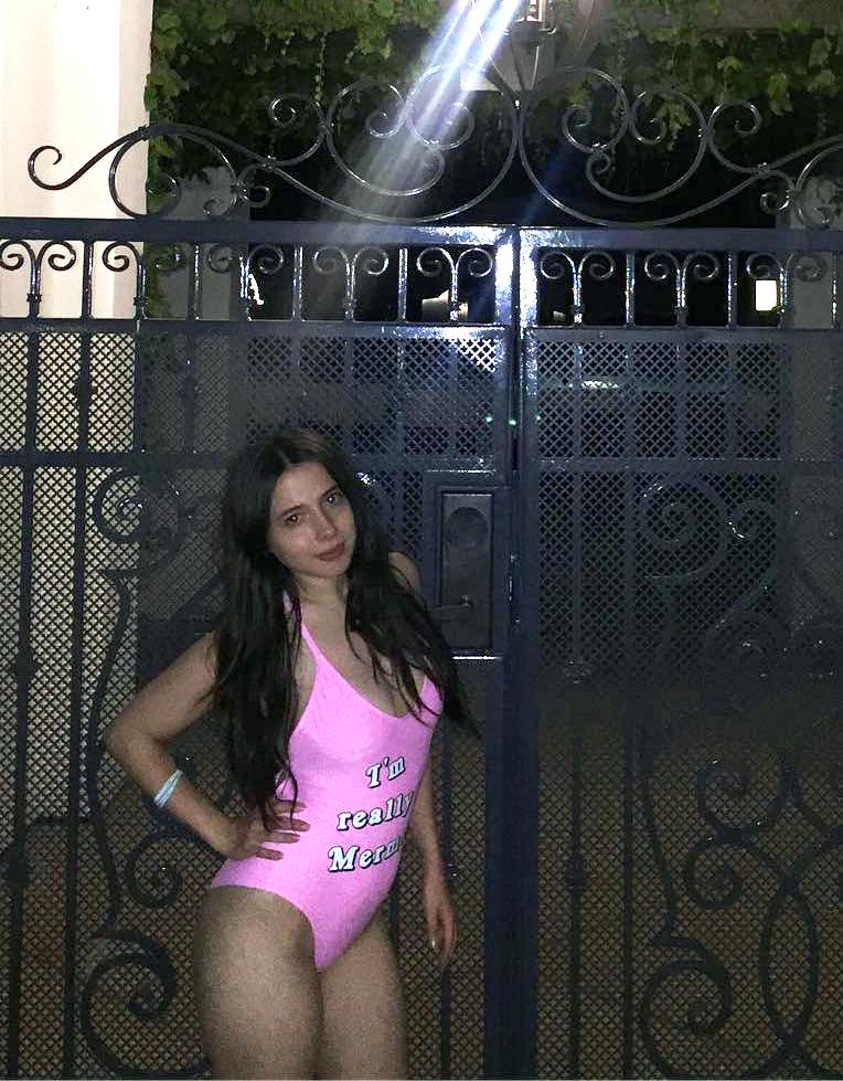 A rare pic of Esther in a swimsuit | Scrolller