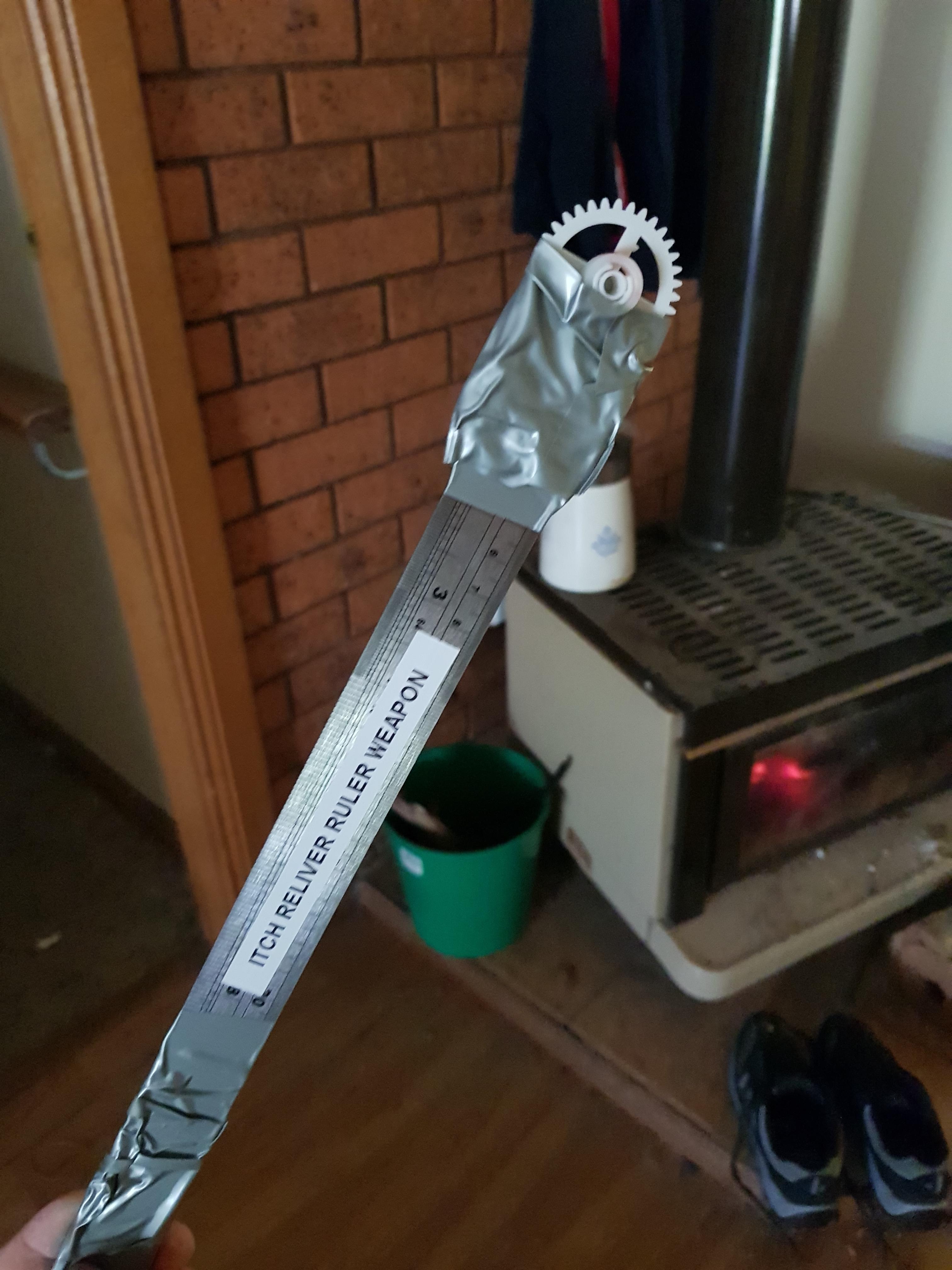 A ruler turned into a backscratcher + self defense item | Scrolller