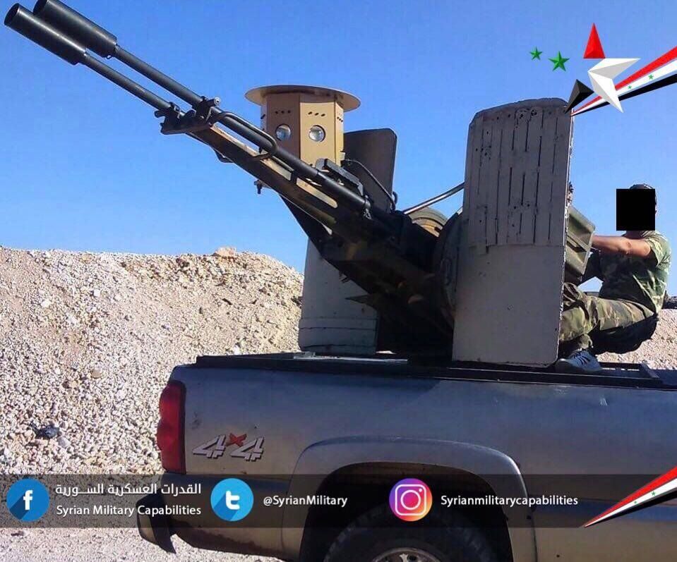 A Syrian Arab Army technical. A ZU-23-2 mounted on a truck, along with the Syrian made Sarab ...