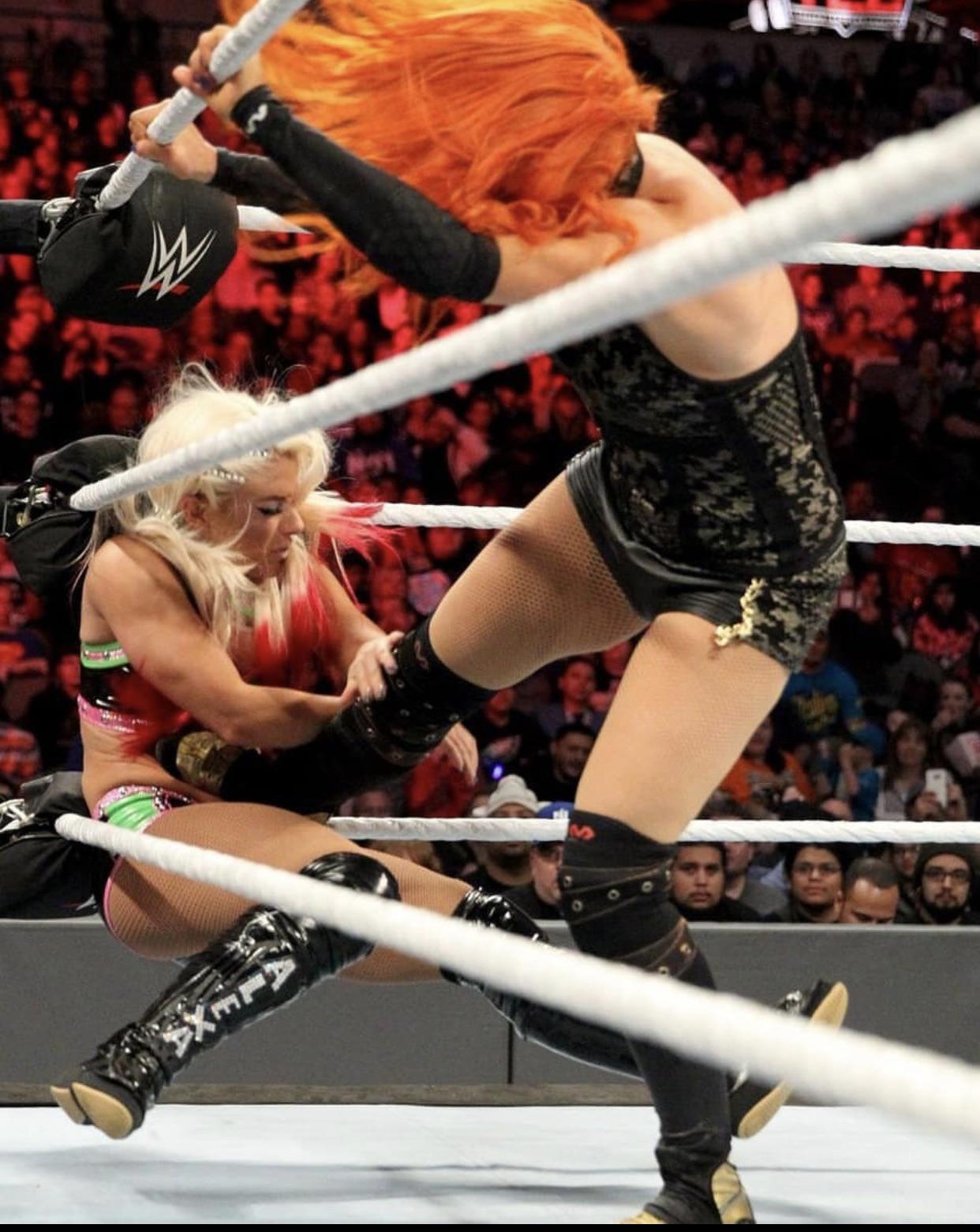 Alexa Bliss getting her Tight Stomach kicked | Scrolller