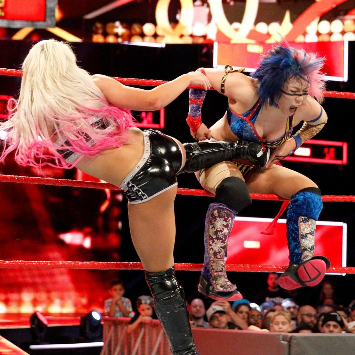 Alexa Bliss kicking Asuka in the guts | Scrolller
