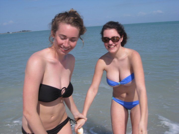 At the beach in bikinis | Scrolller