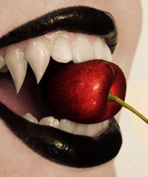 Biting a Cherry | Scrolller