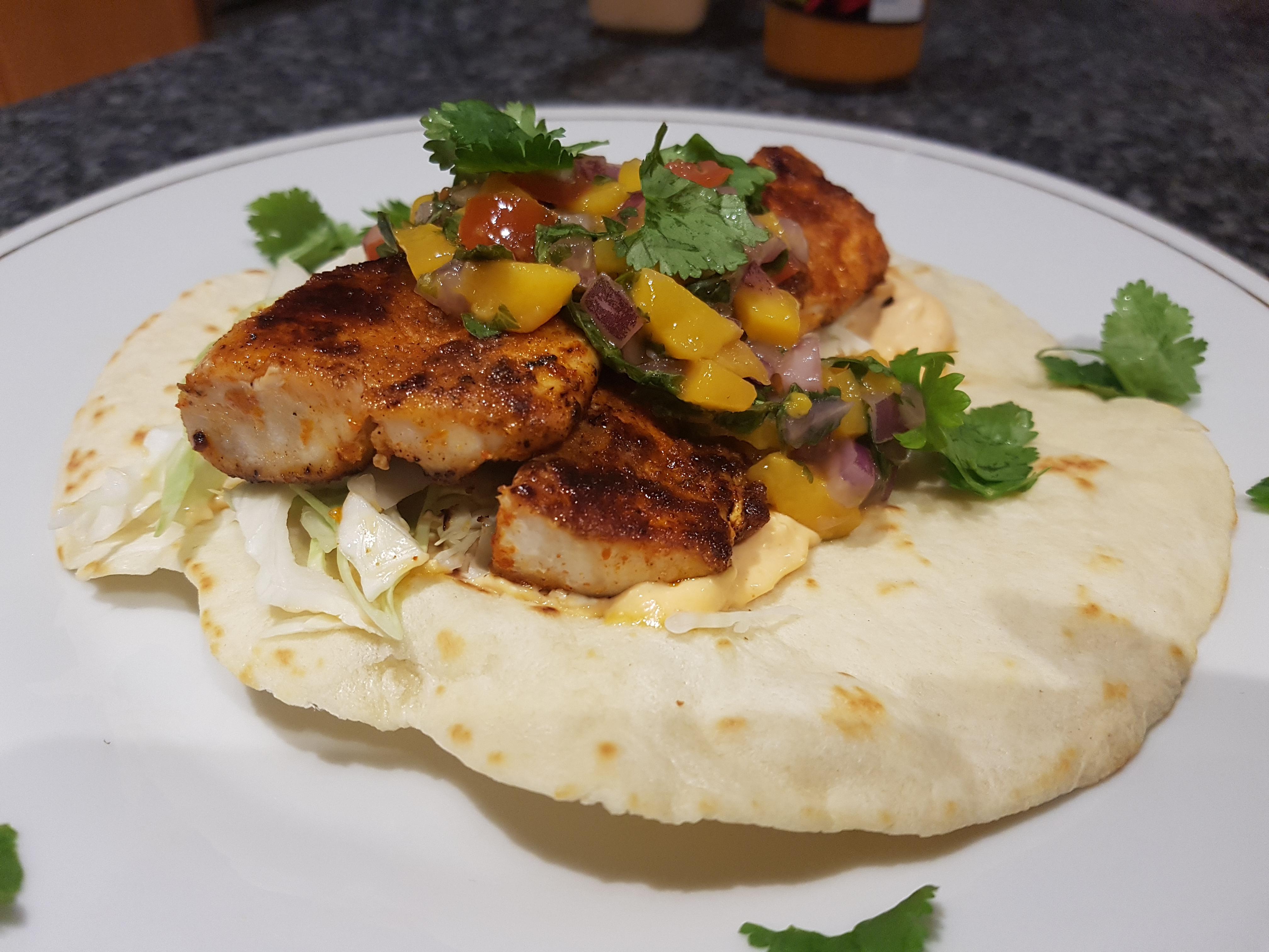 Blackened mahi mahi w/ mango salsa and spicy sauce | Scrolller
