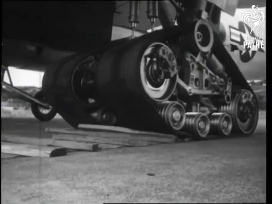 Boeing B-50 fitted with tractor landing gear for landing in fields and other rough terrain ...