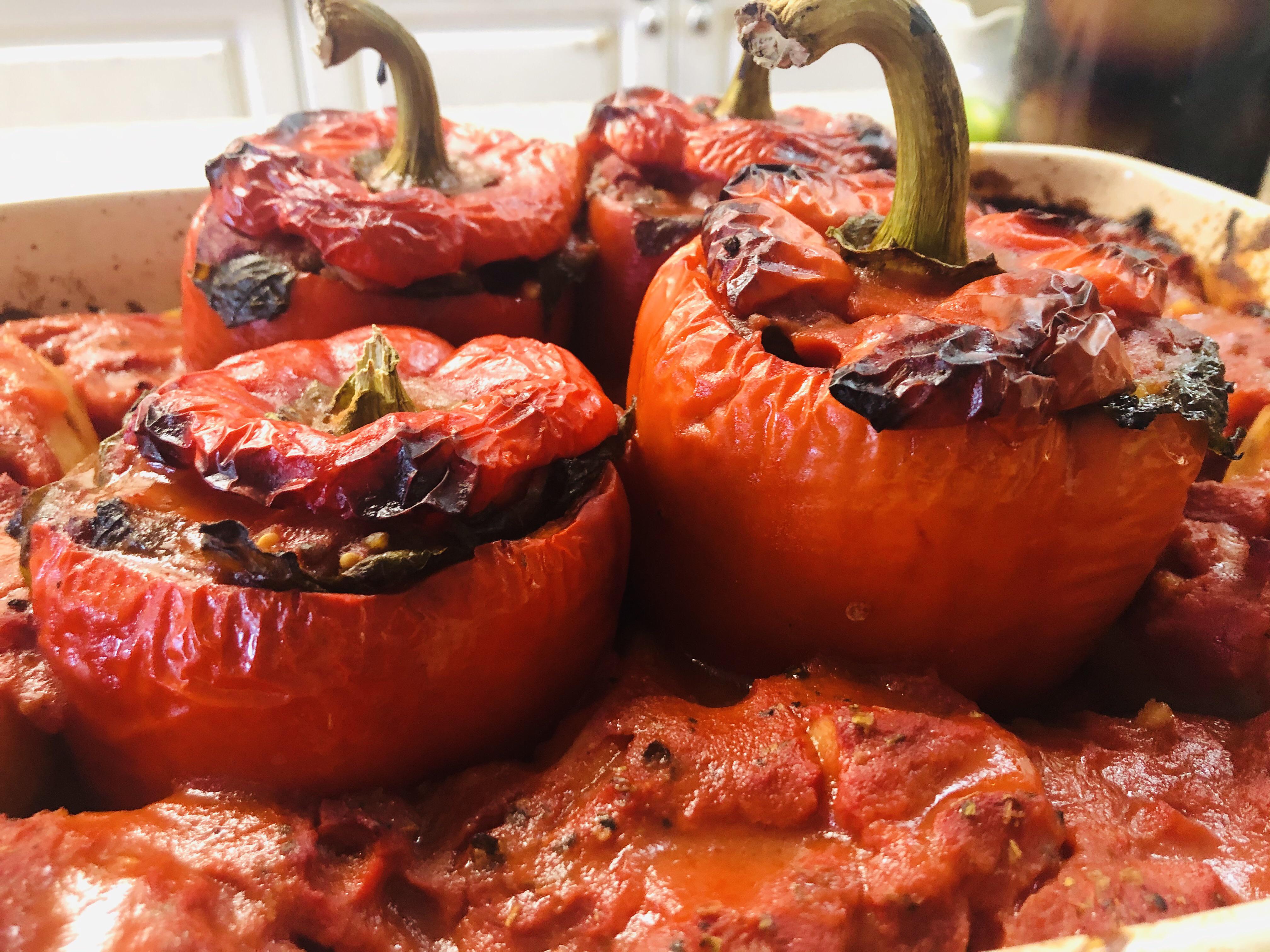 Braised stuffed peppers with potatoes and tomatoes (Yemista) | Scrolller