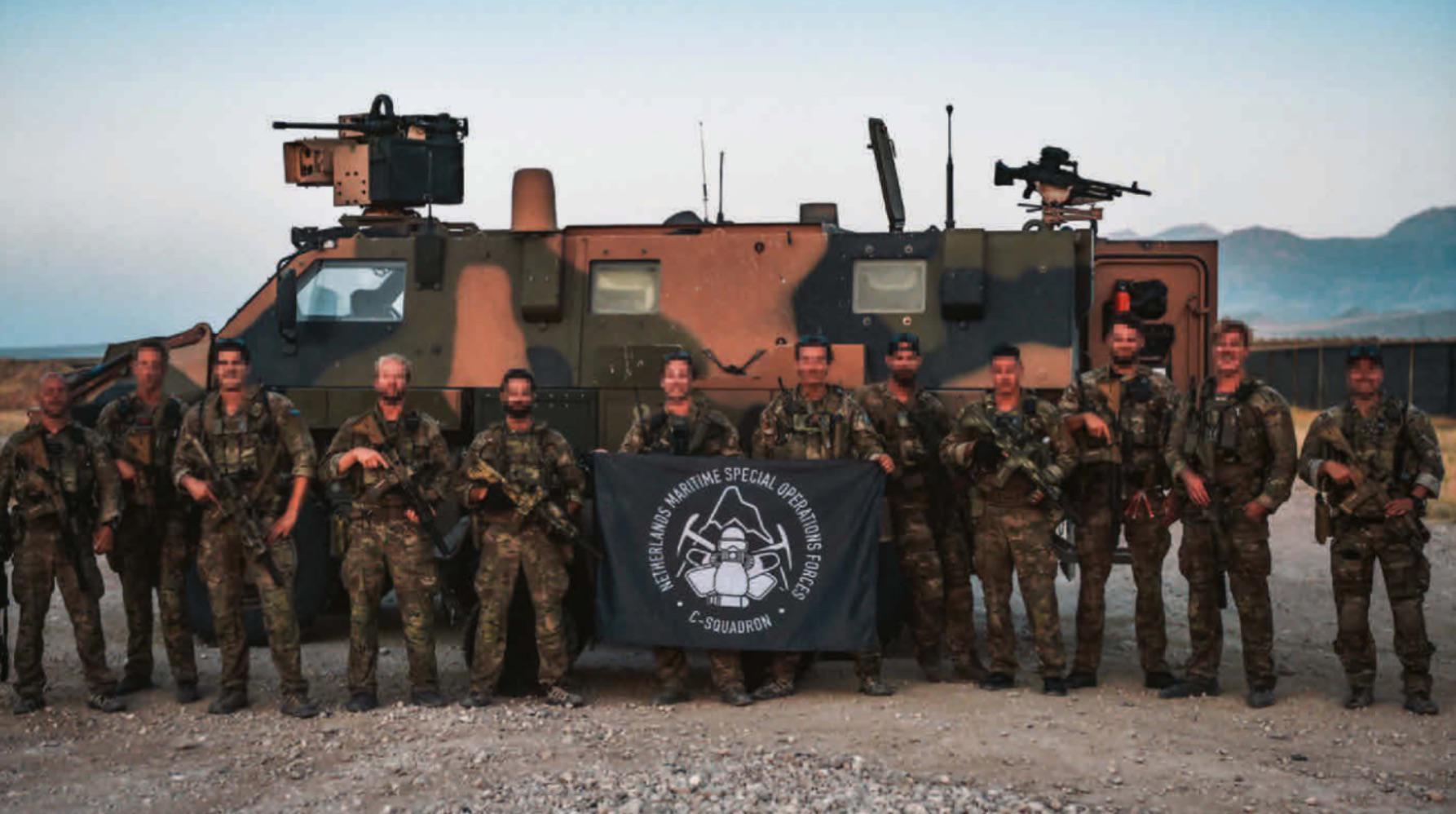 C-Squadron operators of the Netherlands Maritime Special Operations Forces (NLMARSOF) in front ...