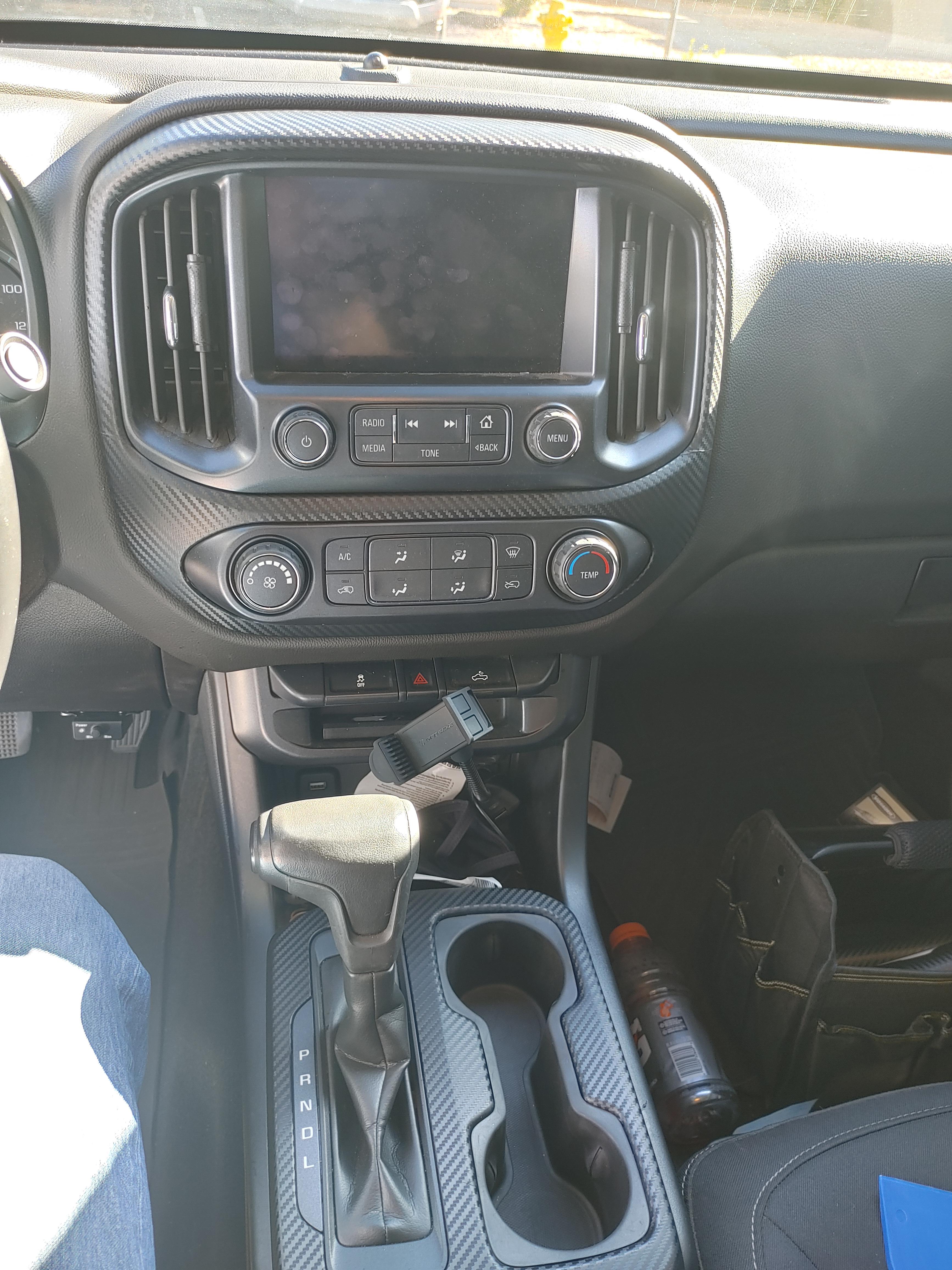 Carbon fiber wrapped the radio and center console bezels! | Scrolller