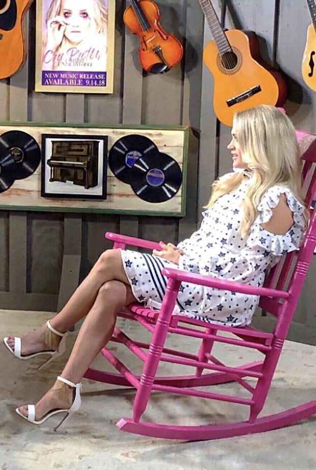 Carrie in a rocking chair | Scrolller