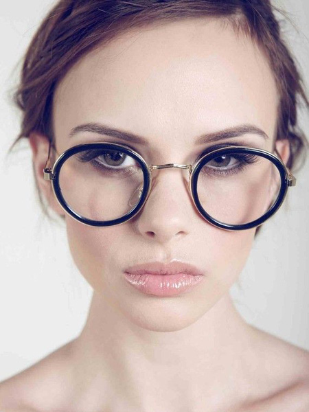 caucasian with round glasses | Scrolller