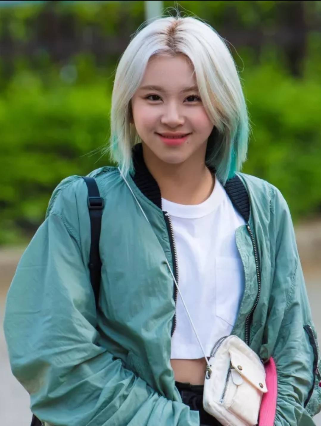 Chaeyoung - blonde hair, green tips, jacket, white shirt | Scrolller
