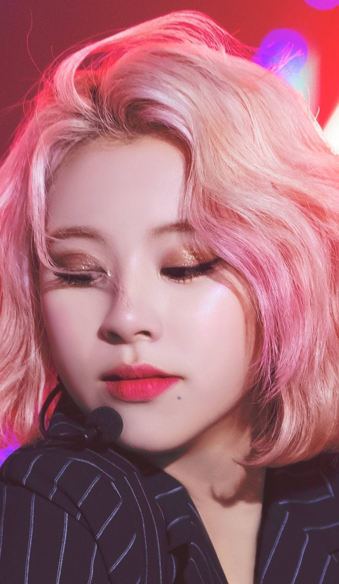 Chaeyoung - pink hair, black striped suit jacket, close up | Scrolller