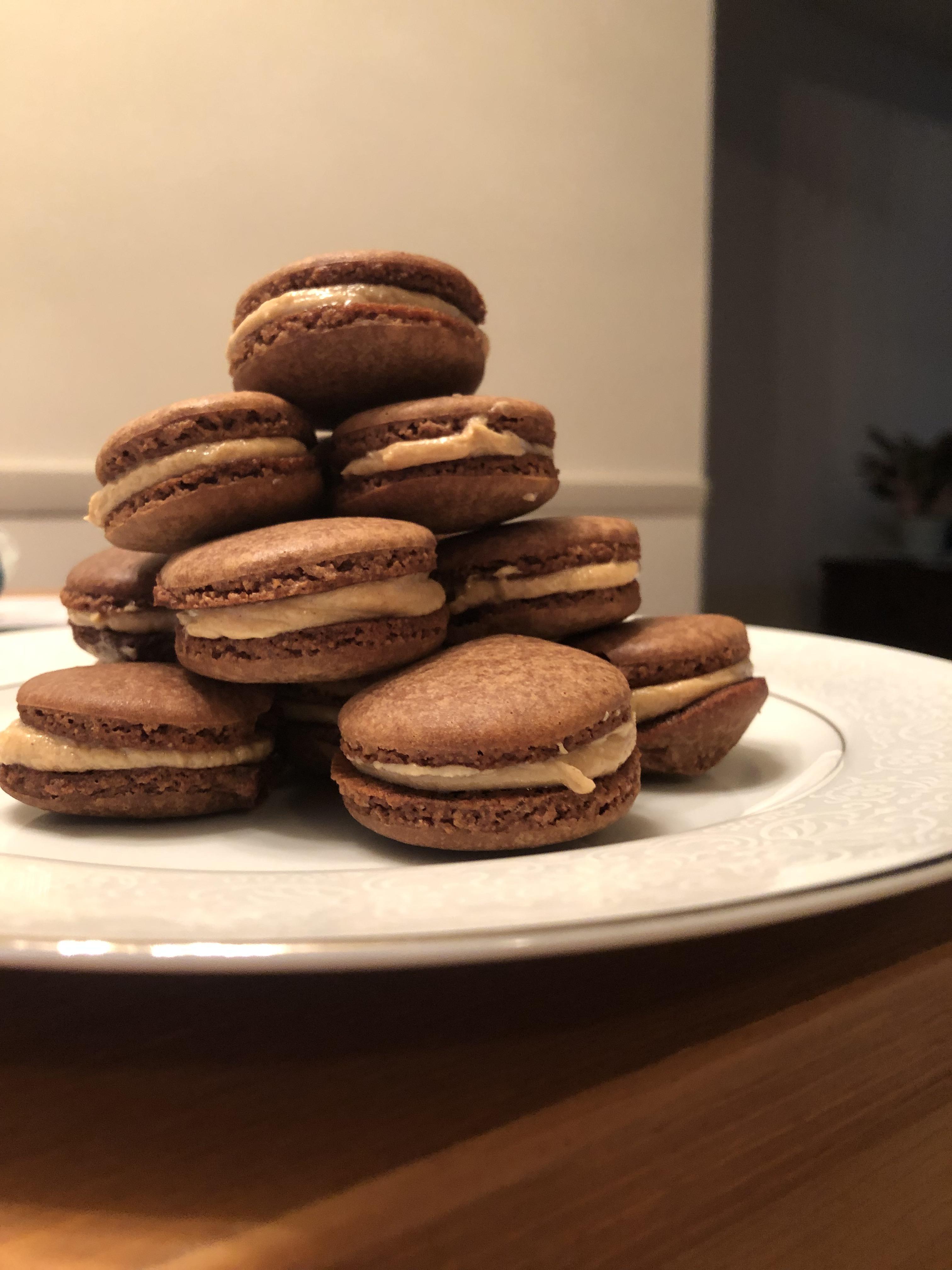 Chocolate peanut butter macarons, first time making them. No recipe, but it did take me 4 hours ...