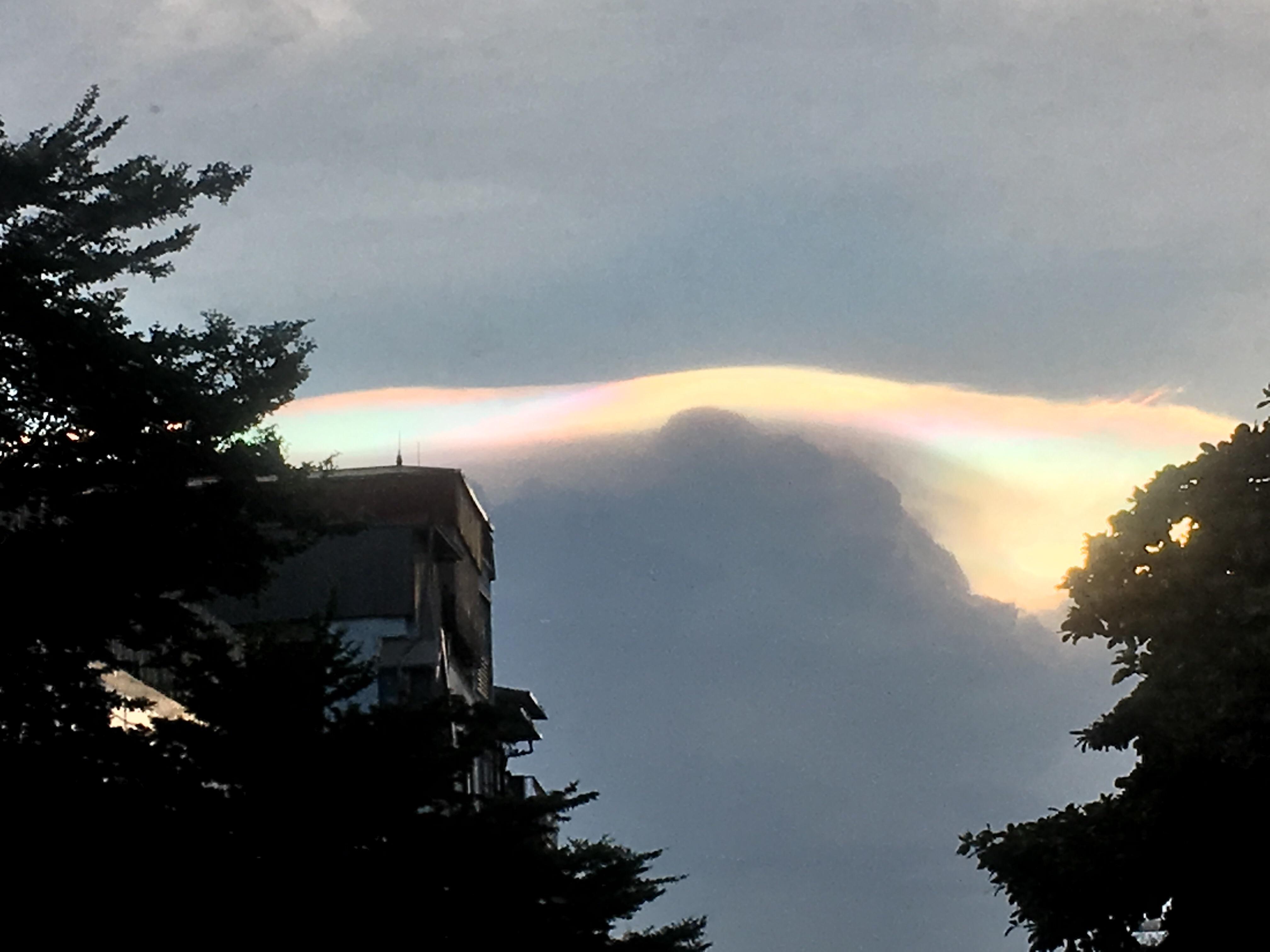 Cloud iridescence, an optical illusion phenomenon happening while i was going home from school ...