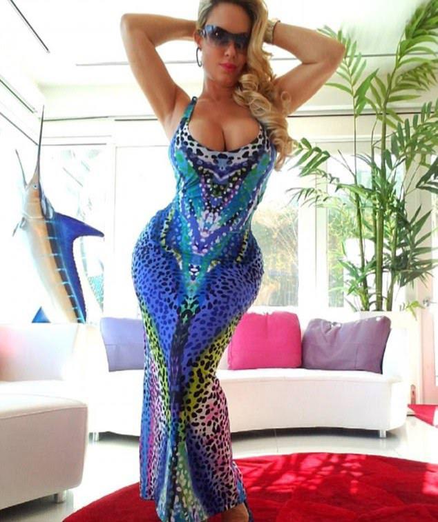 Coco wearing a tight dress | Scrolller