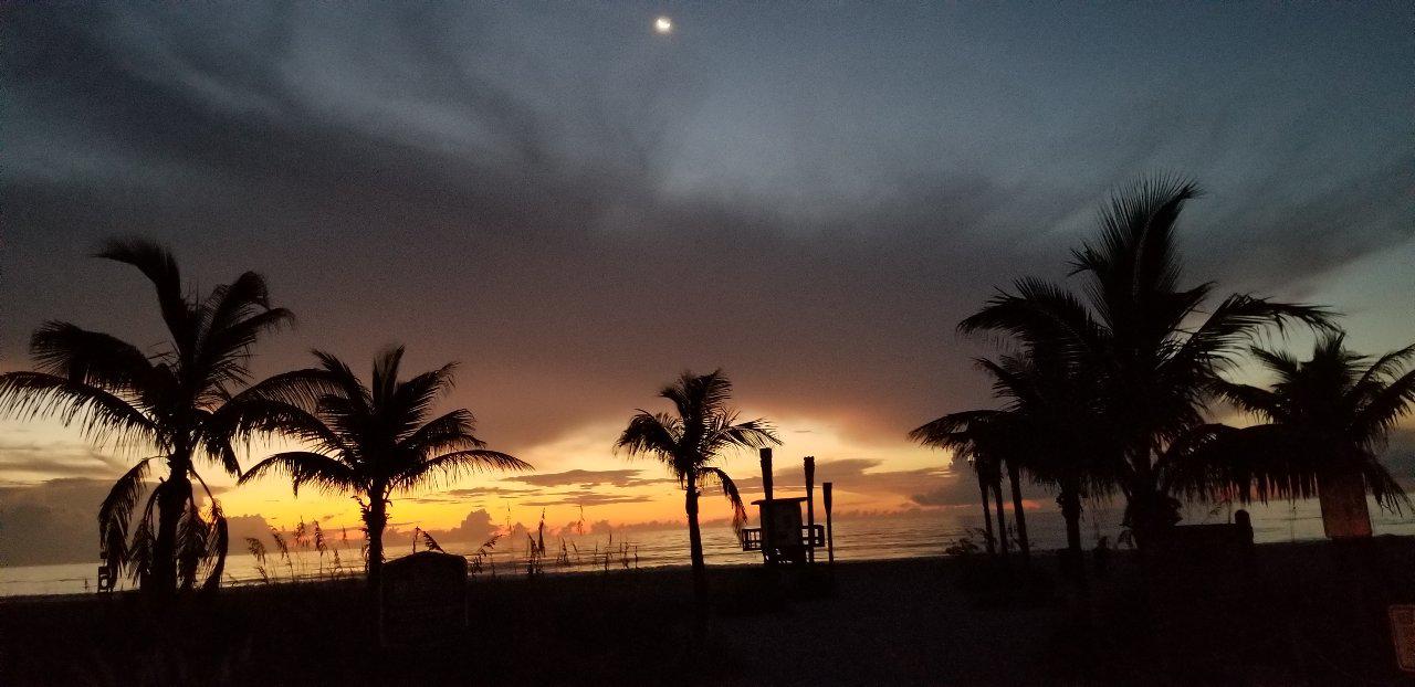 cocoa beach sunrise with half moon | Scrolller