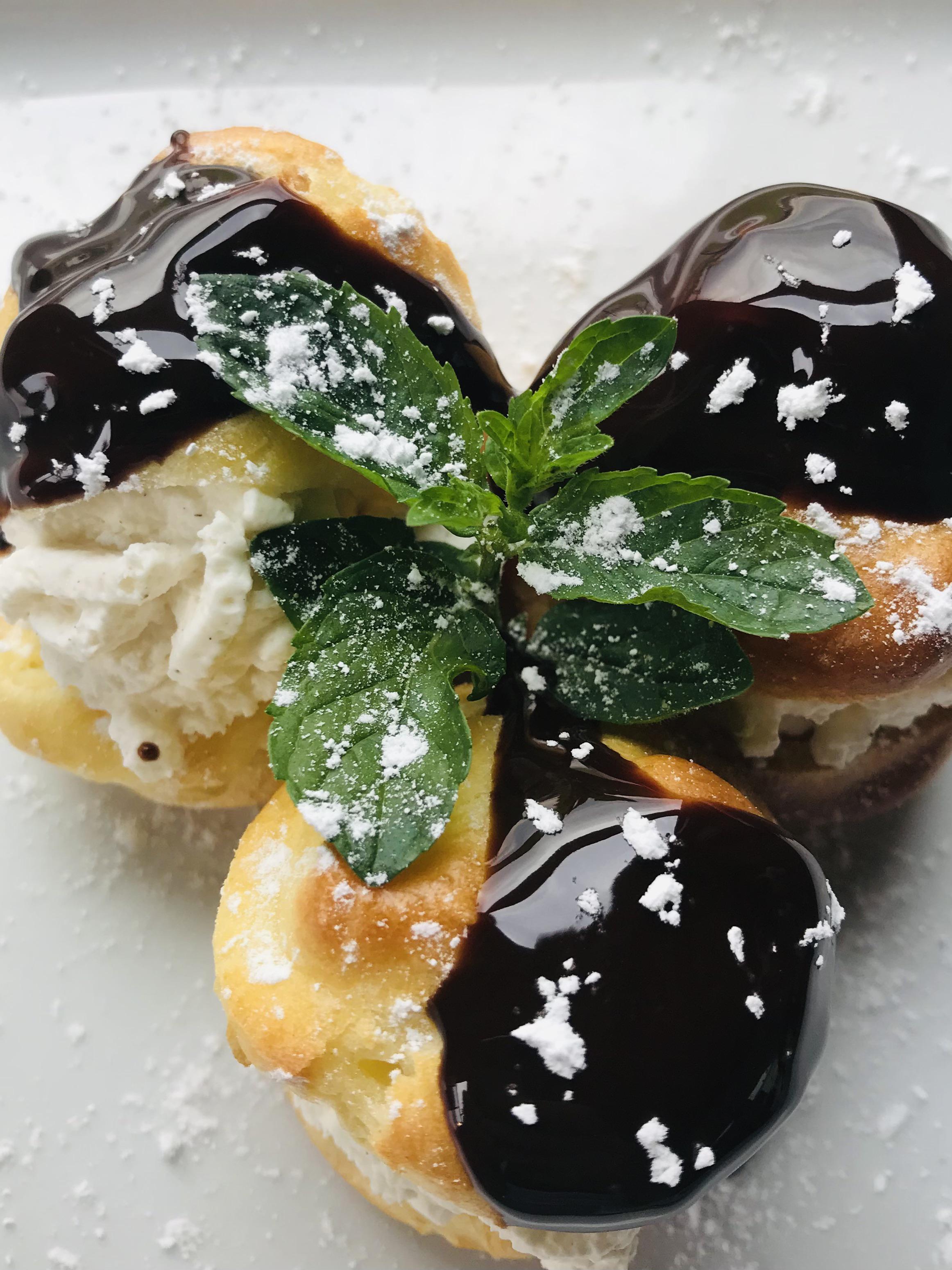 Cream puffs with Hershey’s chocolate syrup. | Scrolller