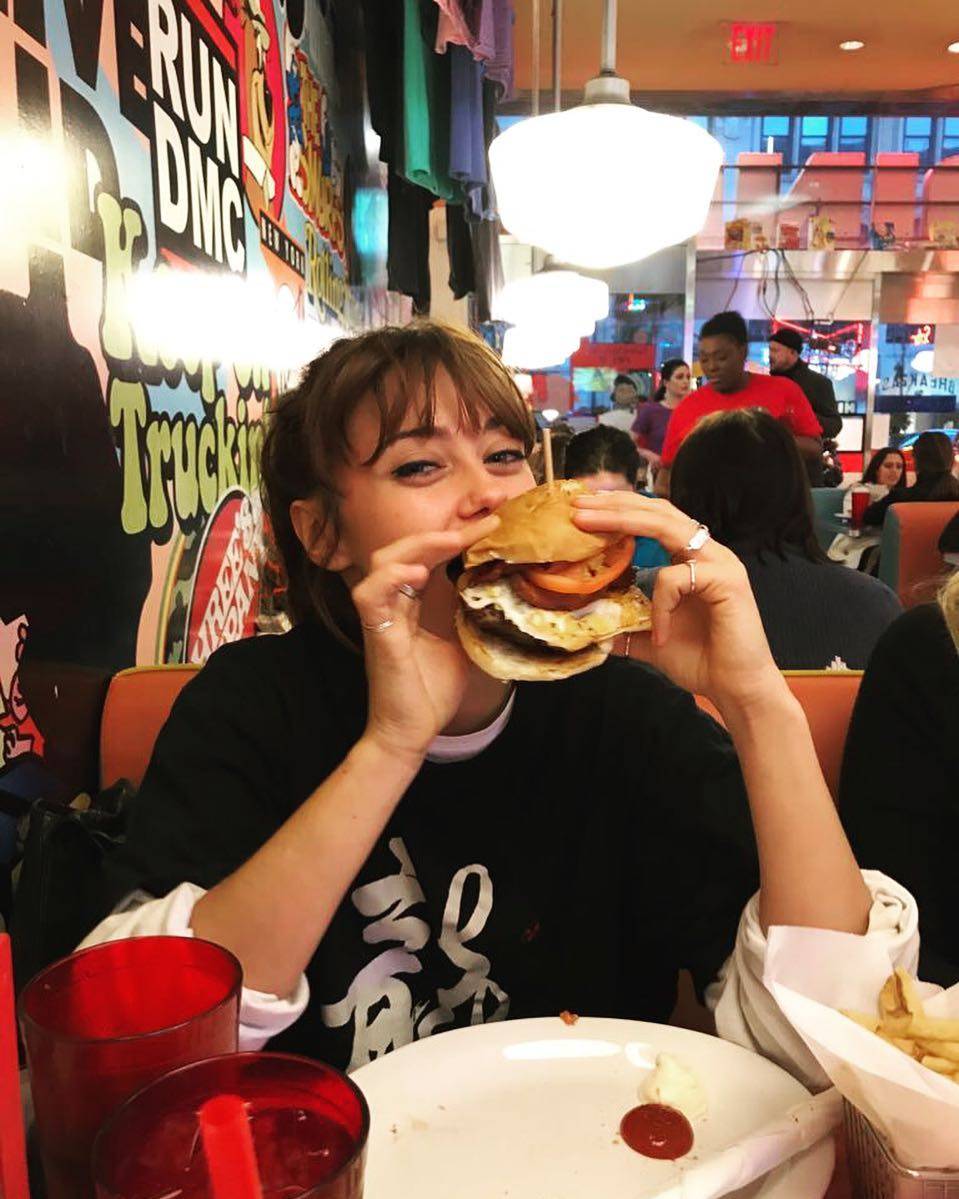 Eating a burger | Scrolller