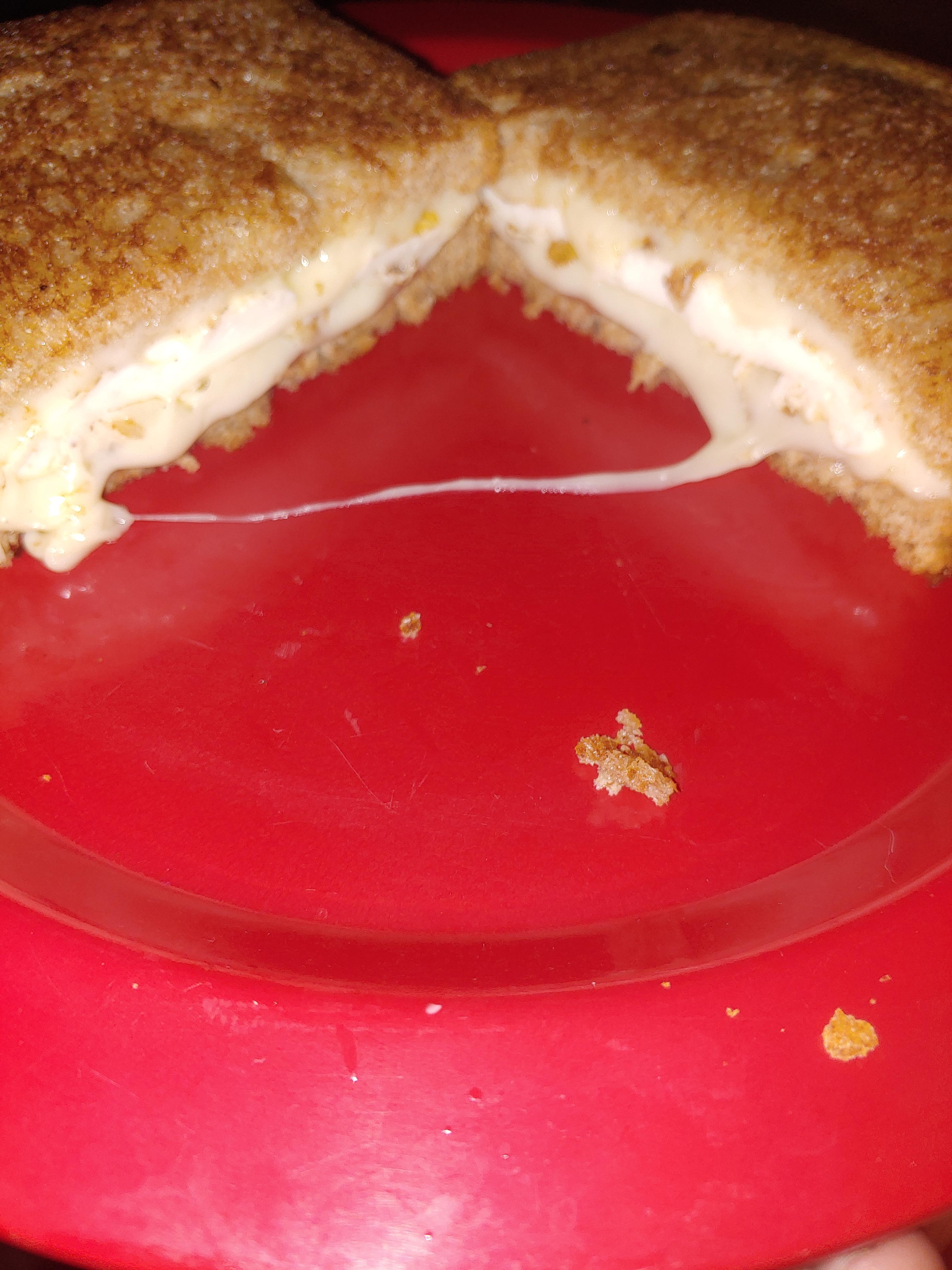 Eggs with Turkey bacon and Swiss on potato bread | Scrolller