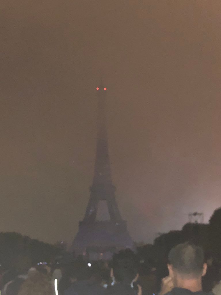Eiffel tower in fog | Scrolller