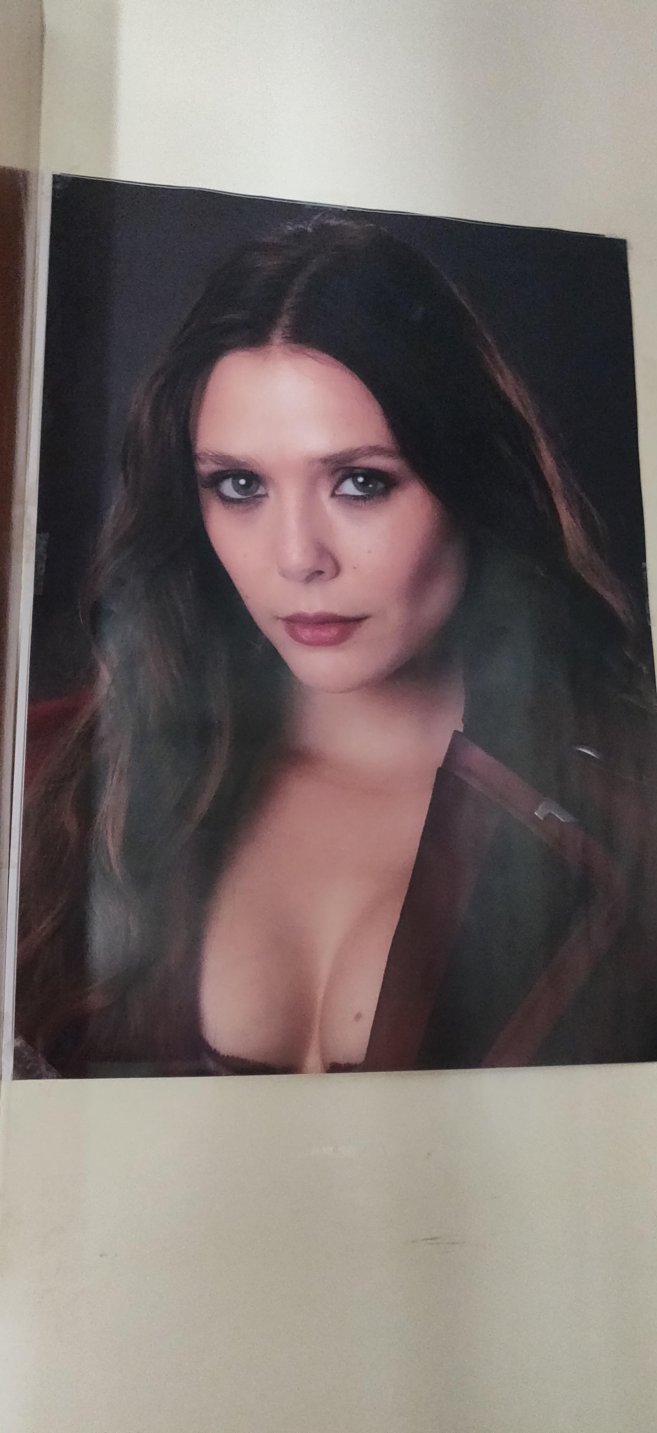 Elizabeth Olsen as Wanda is so sensual in an understated way. | Scrolller