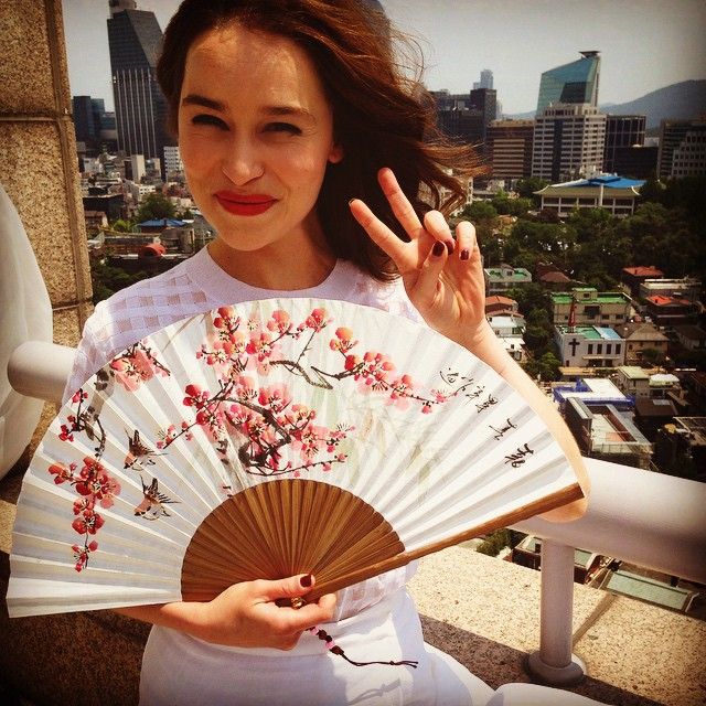 Emilia with a fan | Scrolller