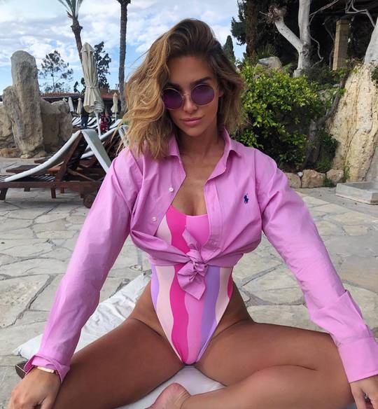 Emily Shak - Spread leg pose | Scrolller