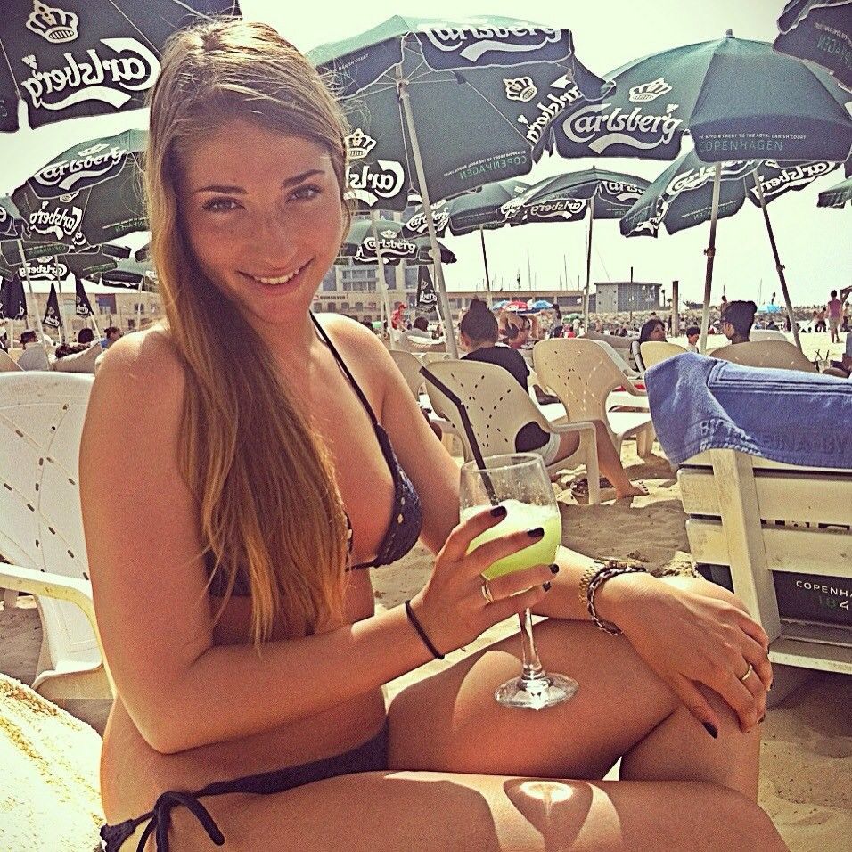 Enjoying a beach cocktail | Scrolller