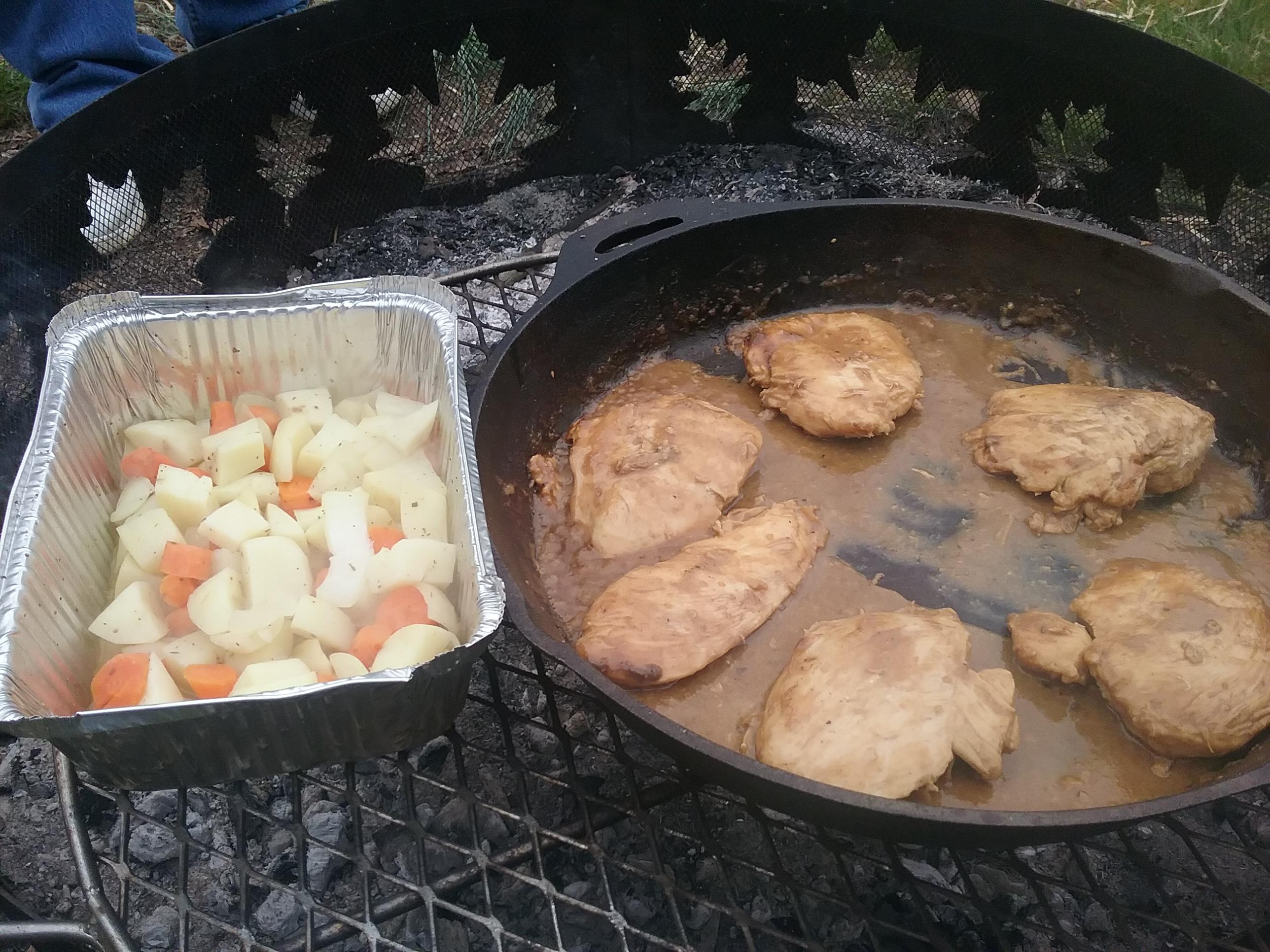First campfire meal of the year. Glazed chicken and root vegetables. | Scrolller
